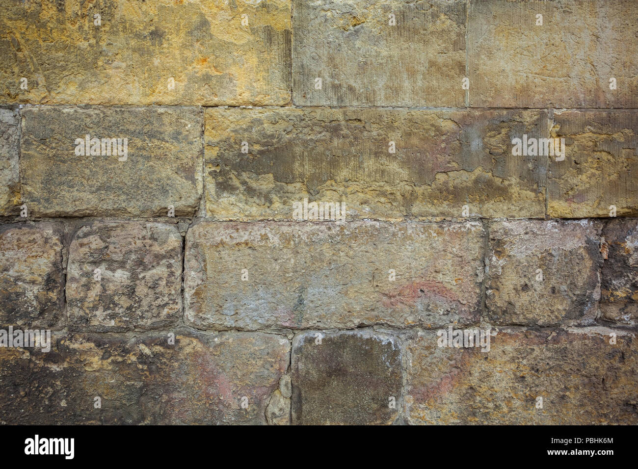 Stone wall background Wall made of cavern rock Stock Photo - Alamy