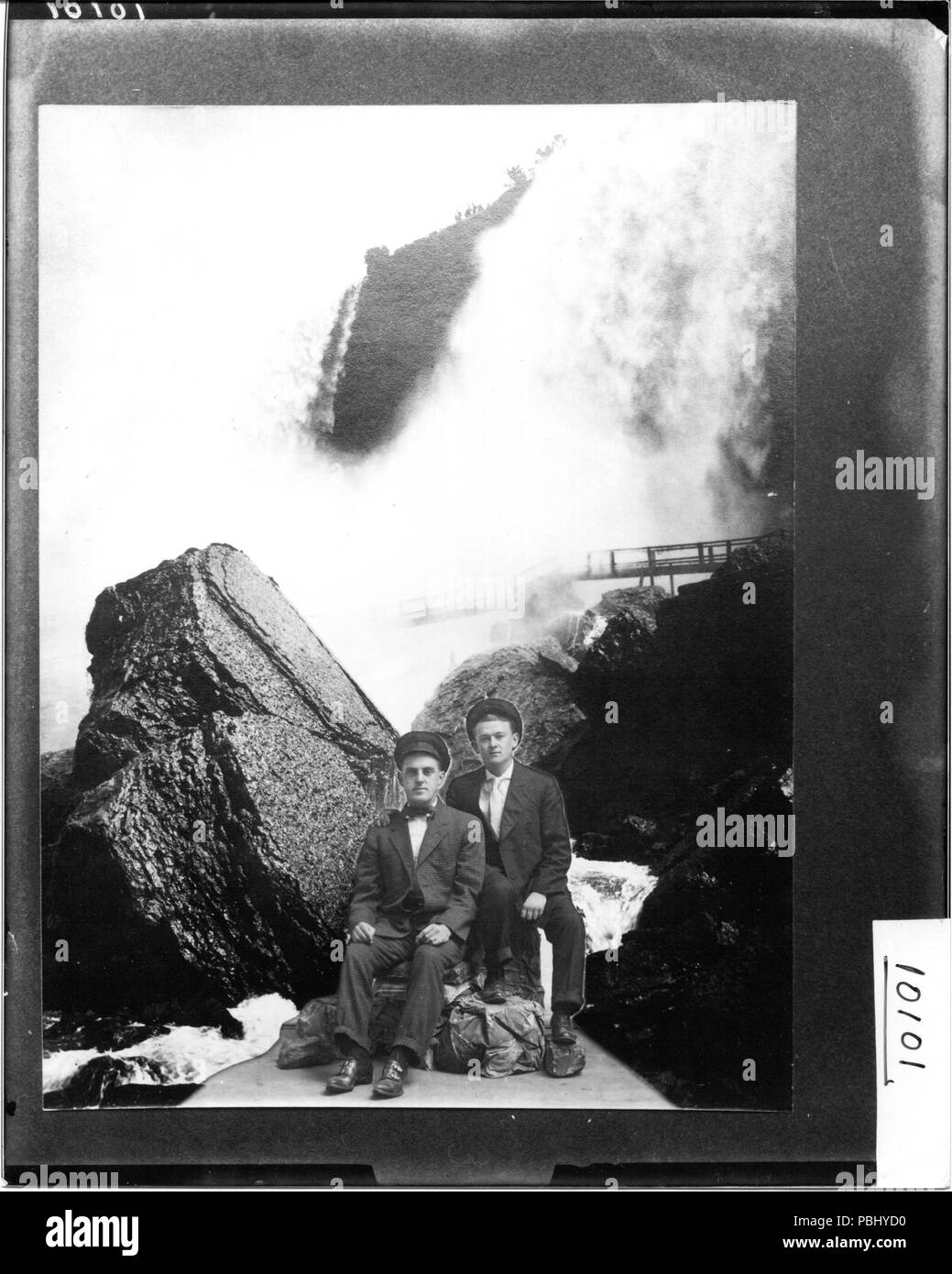 Men seated Black and White Stock Photos & Images - Alamy