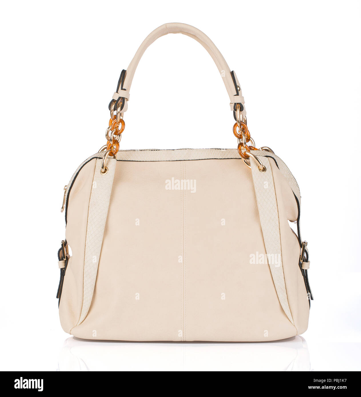 Elegant women beige bag on white background Stock Photo - Alamy