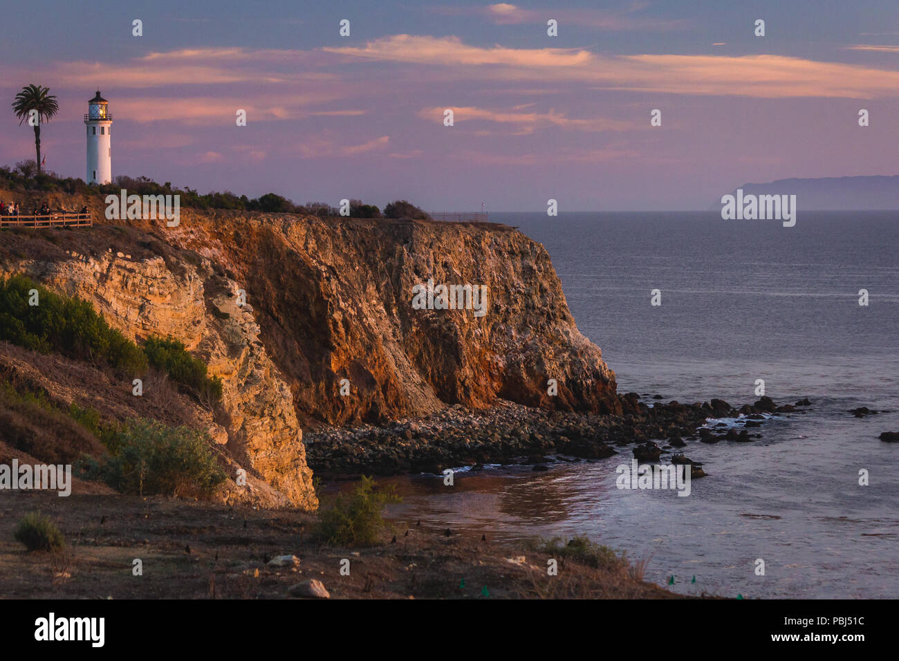 Beautiful coastal view of Point Vicente Lighthouse atop the steep cliffs of Rancho Palos Verdes ...
