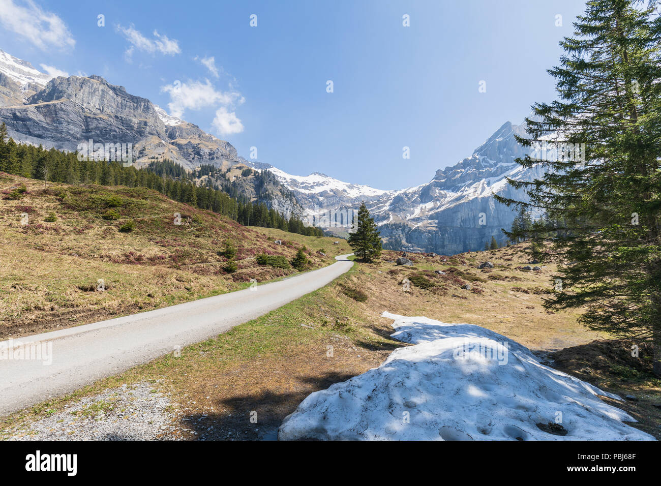 Panorama view of the Alps on a snow covered hiking path near Kandersteg ...