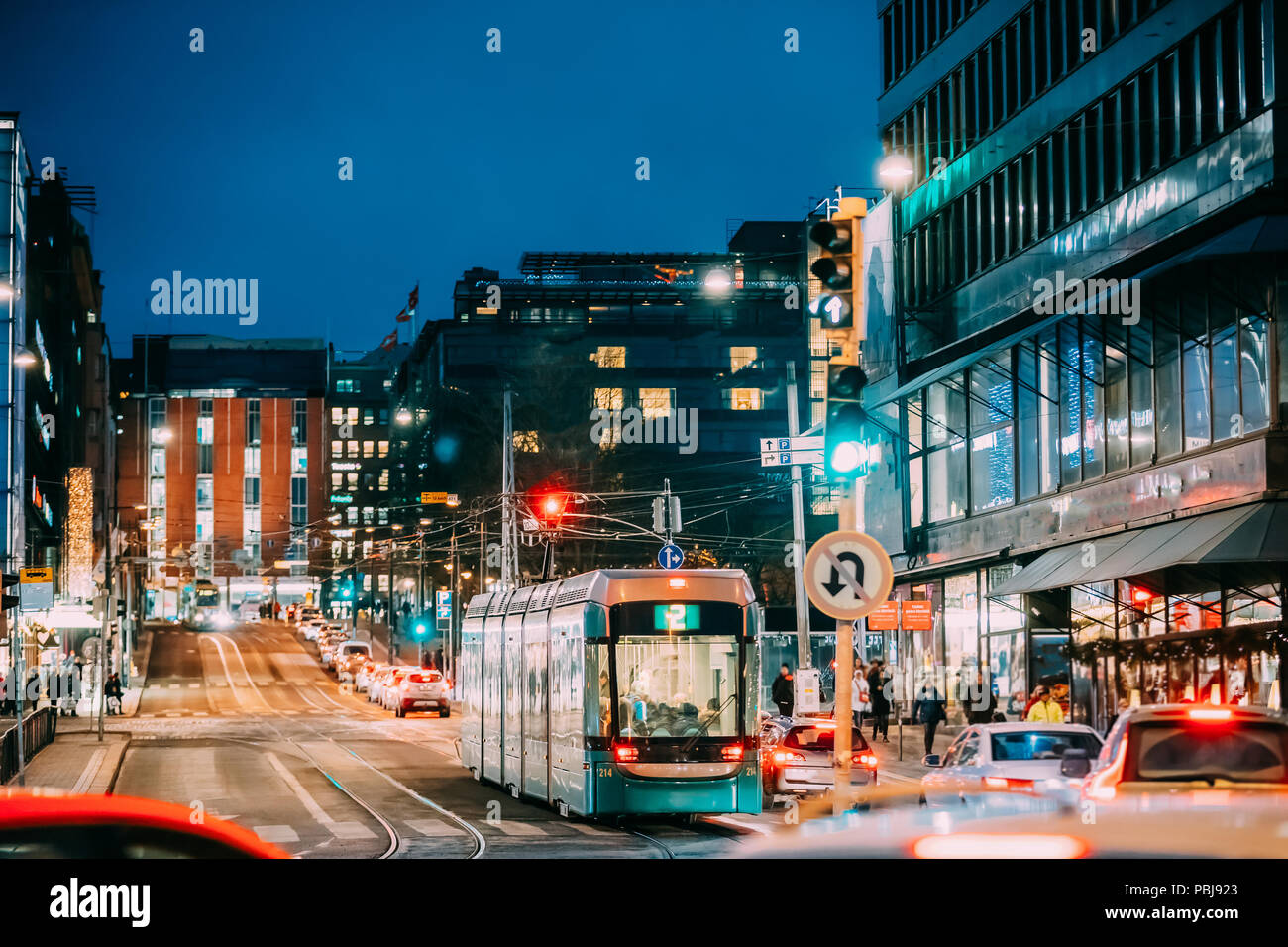 Helsinki, Finland. Tram Departs From A Stop On Kaivokatu Street In ...