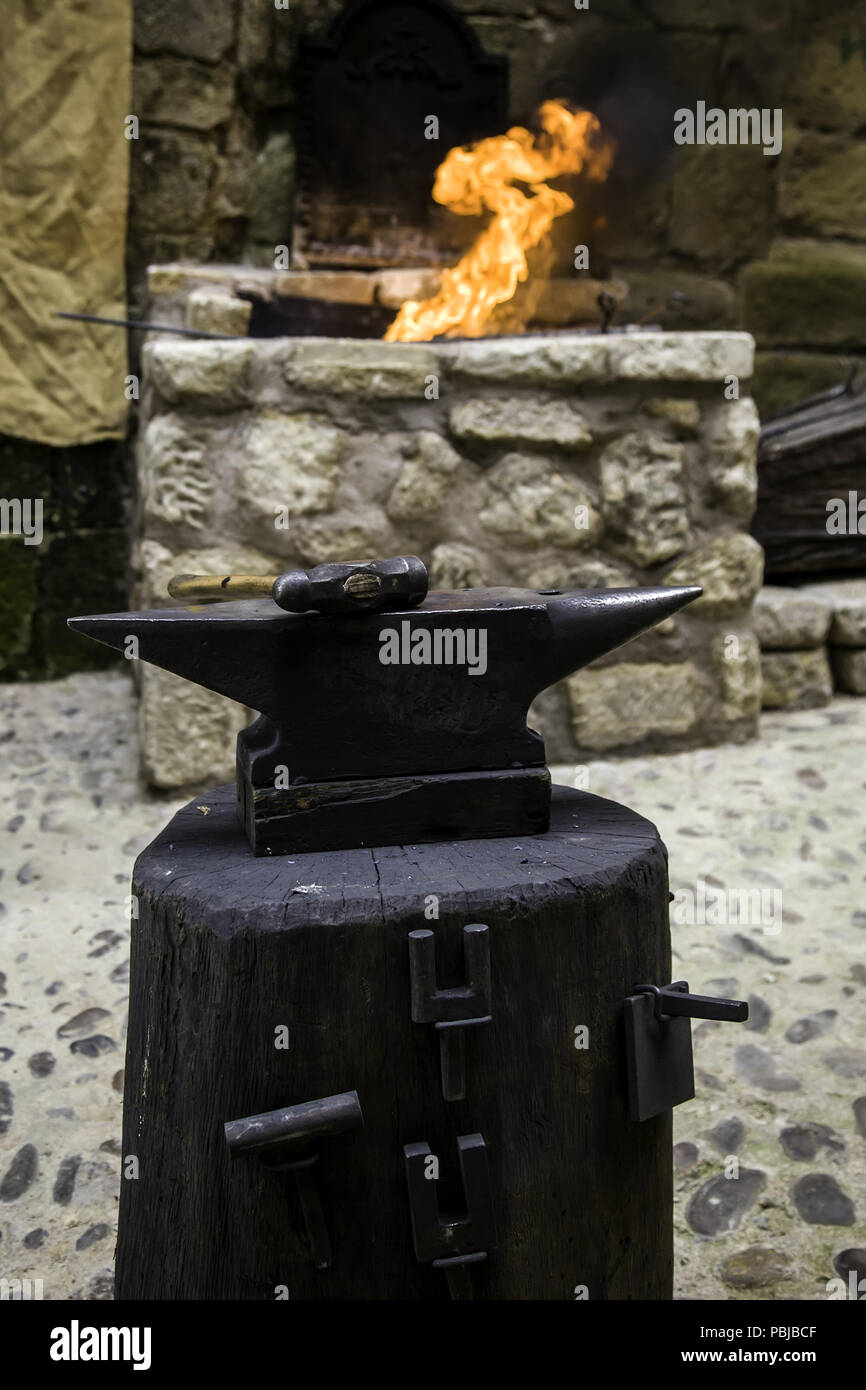 Iron incandescent in an old metal forge, industry detail Stock Photo ...