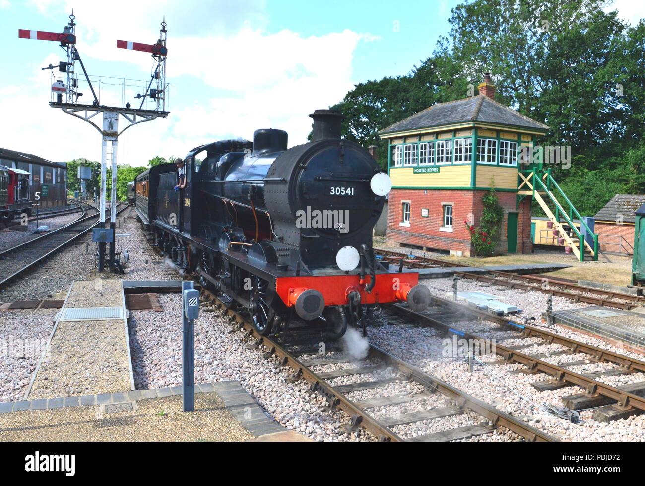A steam train on the Bluebell Railway Stock Photo - Alamy