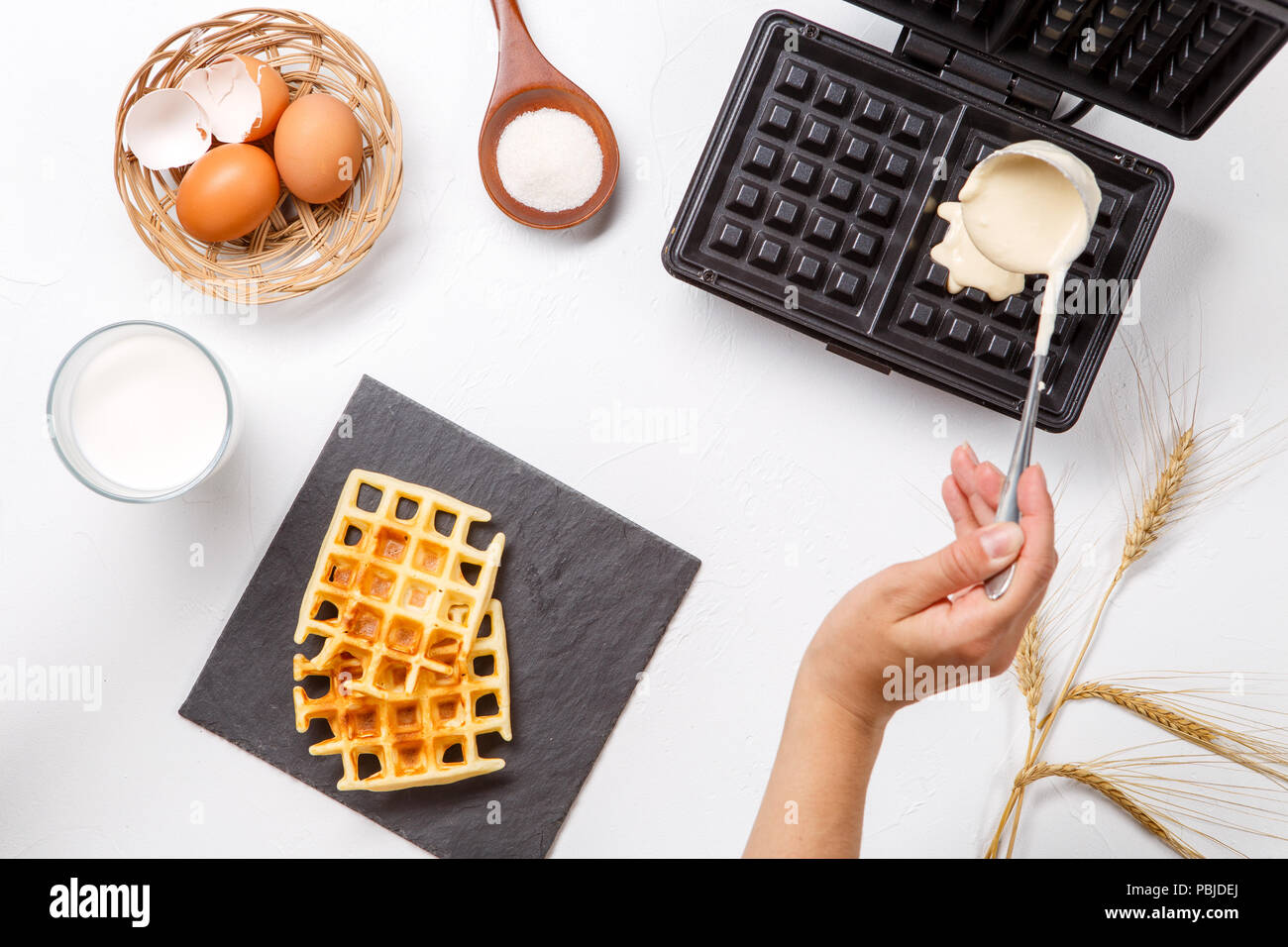 Photo on top of flour, eggs, waffle iron, spikelets, fresh roasted ...
