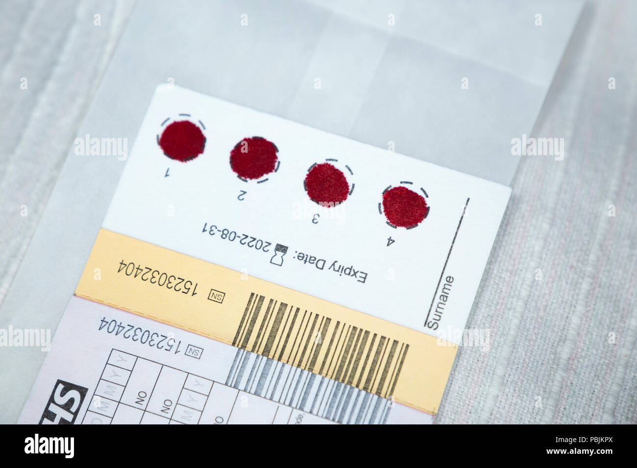 'Guthrie test' card where blood from a newborn / new born baby drops ...