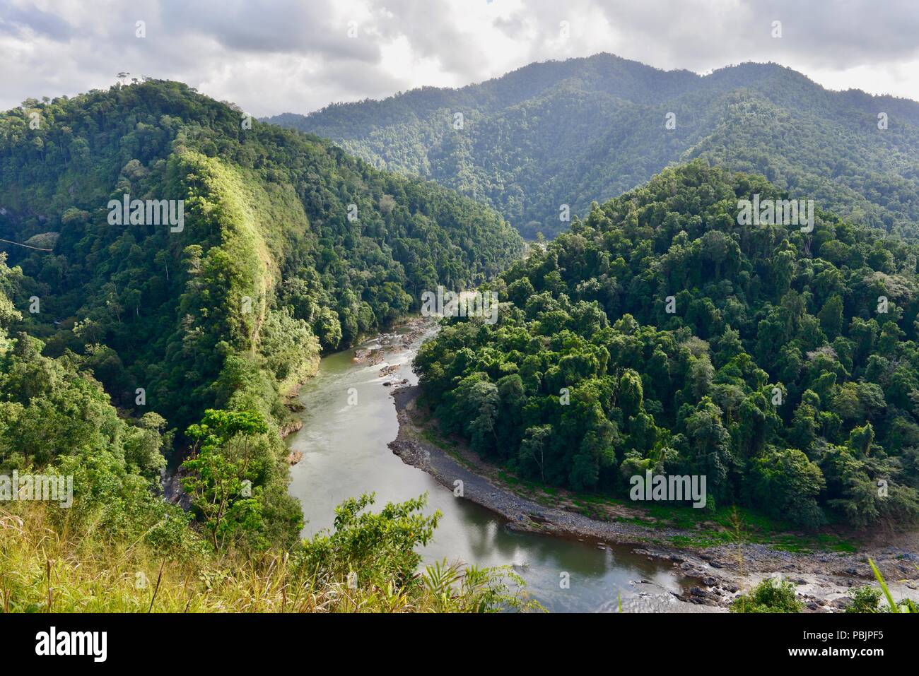 A scenic view of the Johnstone river and mountains at the North ...