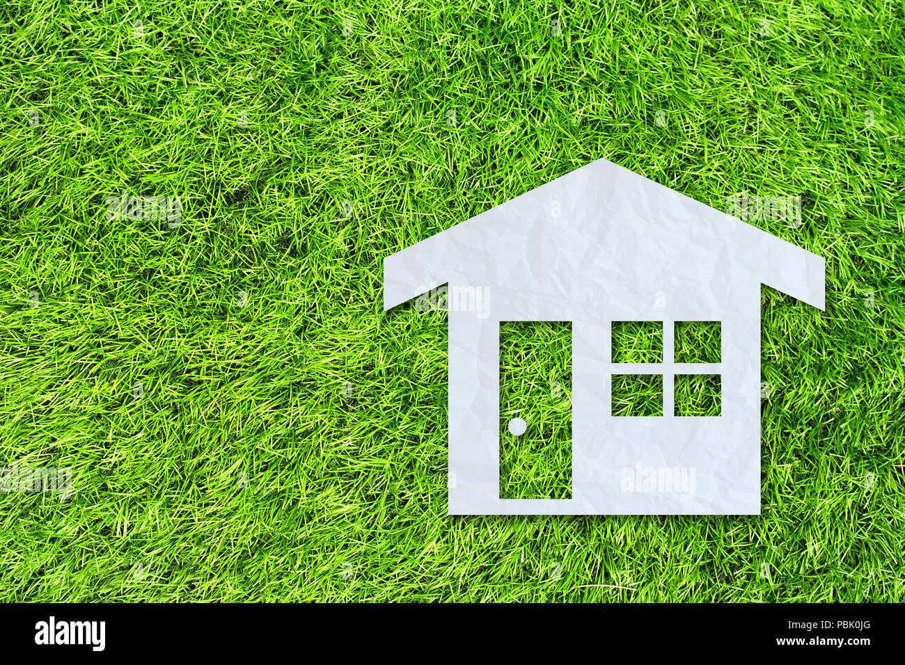 House on green grass background Stock Photo - Alamy