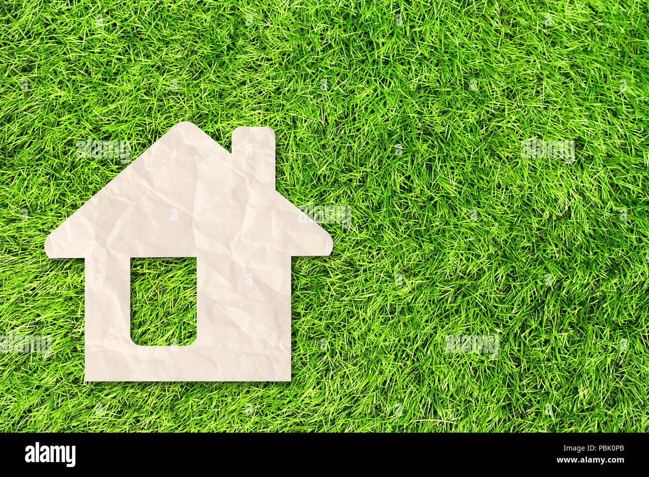 House on green grass background Stock Photo - Alamy