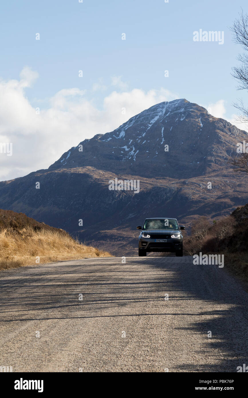 Car on A838 underneath Ben Stack, Sutherland Stock Photo - Alamy