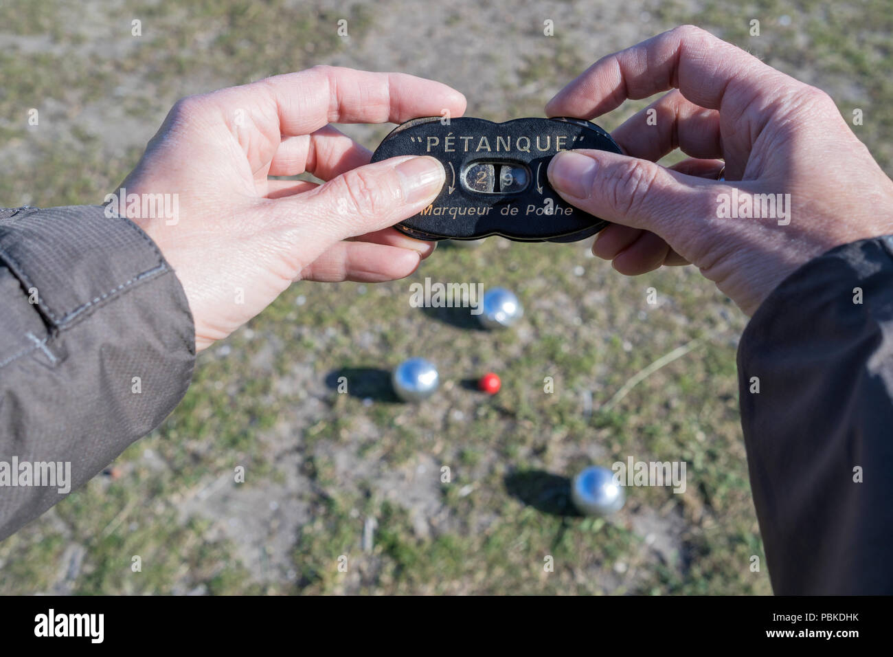 score at petanque game on grass Stock Photo - Alamy