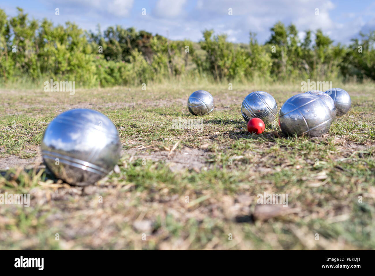 Petanque game play grass ball balls competition hi-res stock ...