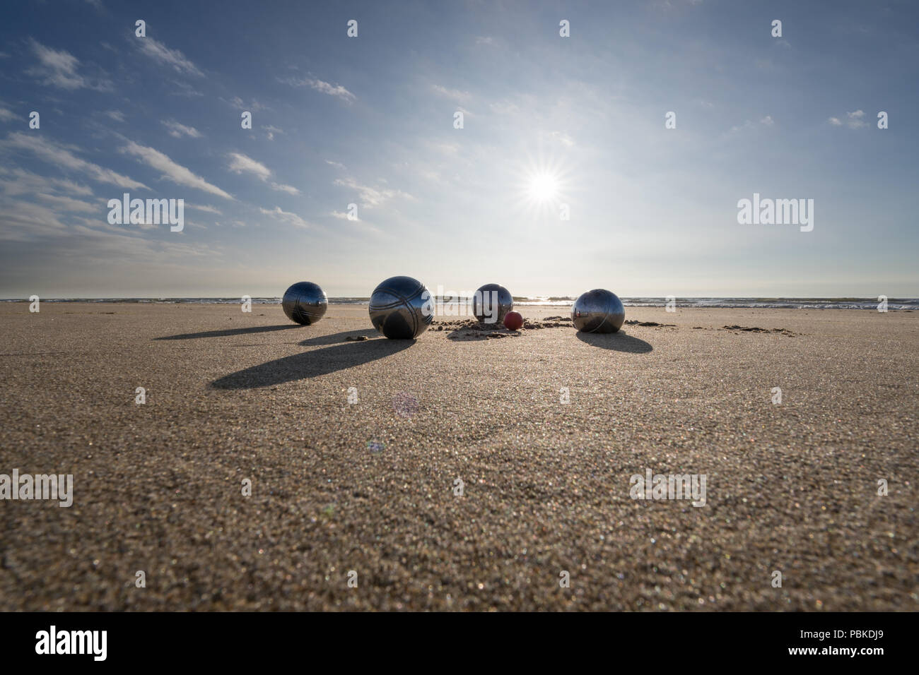 petanque balls on sandy beach Stock Photo - Alamy