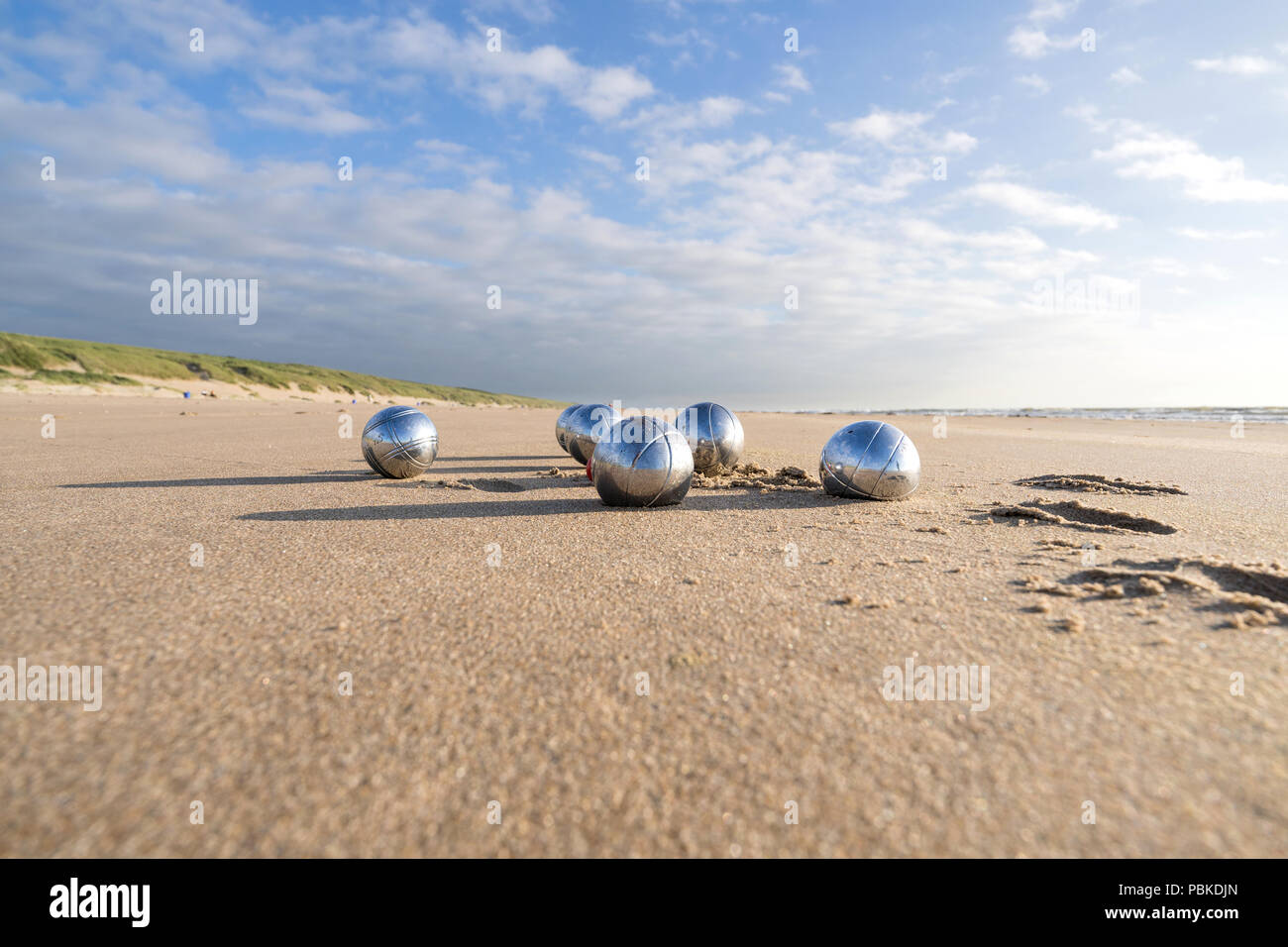 petanque balls on sandy beach Stock Photo - Alamy