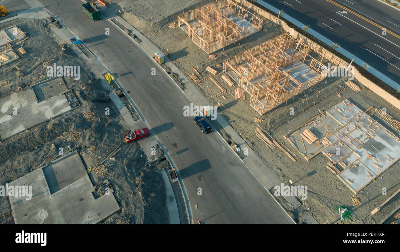 Drone Aerial View of Home Construction Site Foundations and Framing ...
