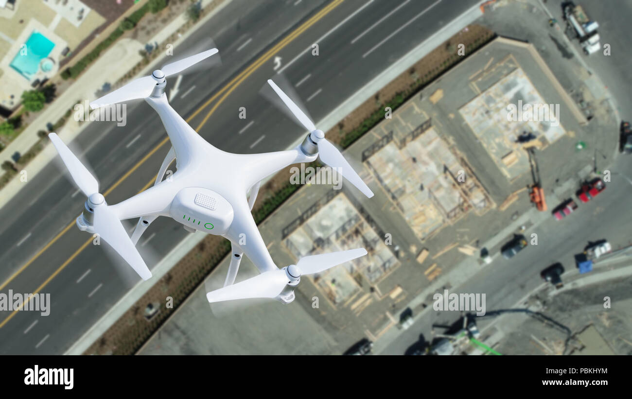 Unmanned Aircraft System (UAV) Quadcopter Drone In The Air Over ...