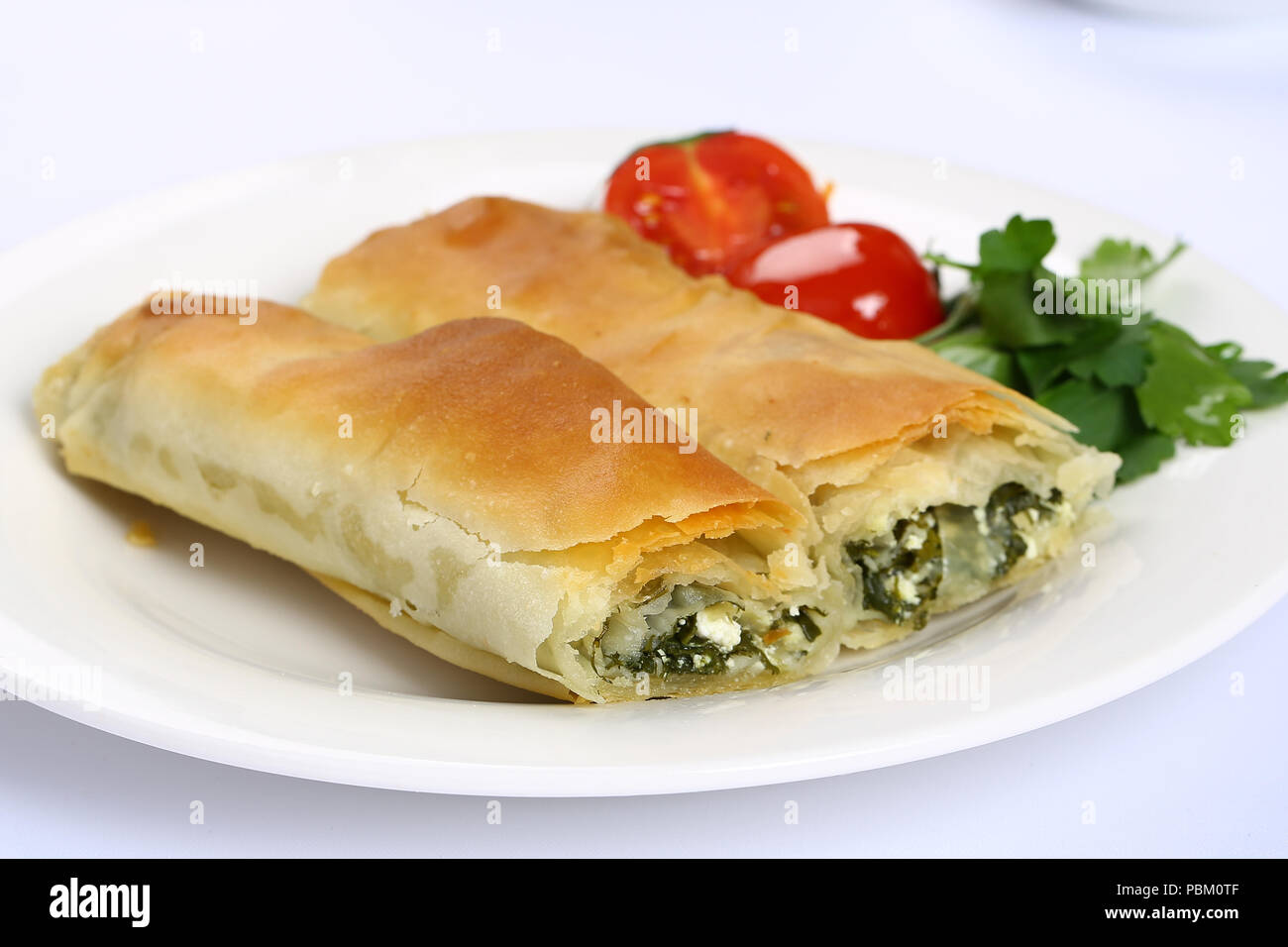 Freshly baked Turkish borek pastry rolls Stock Photo - Alamy