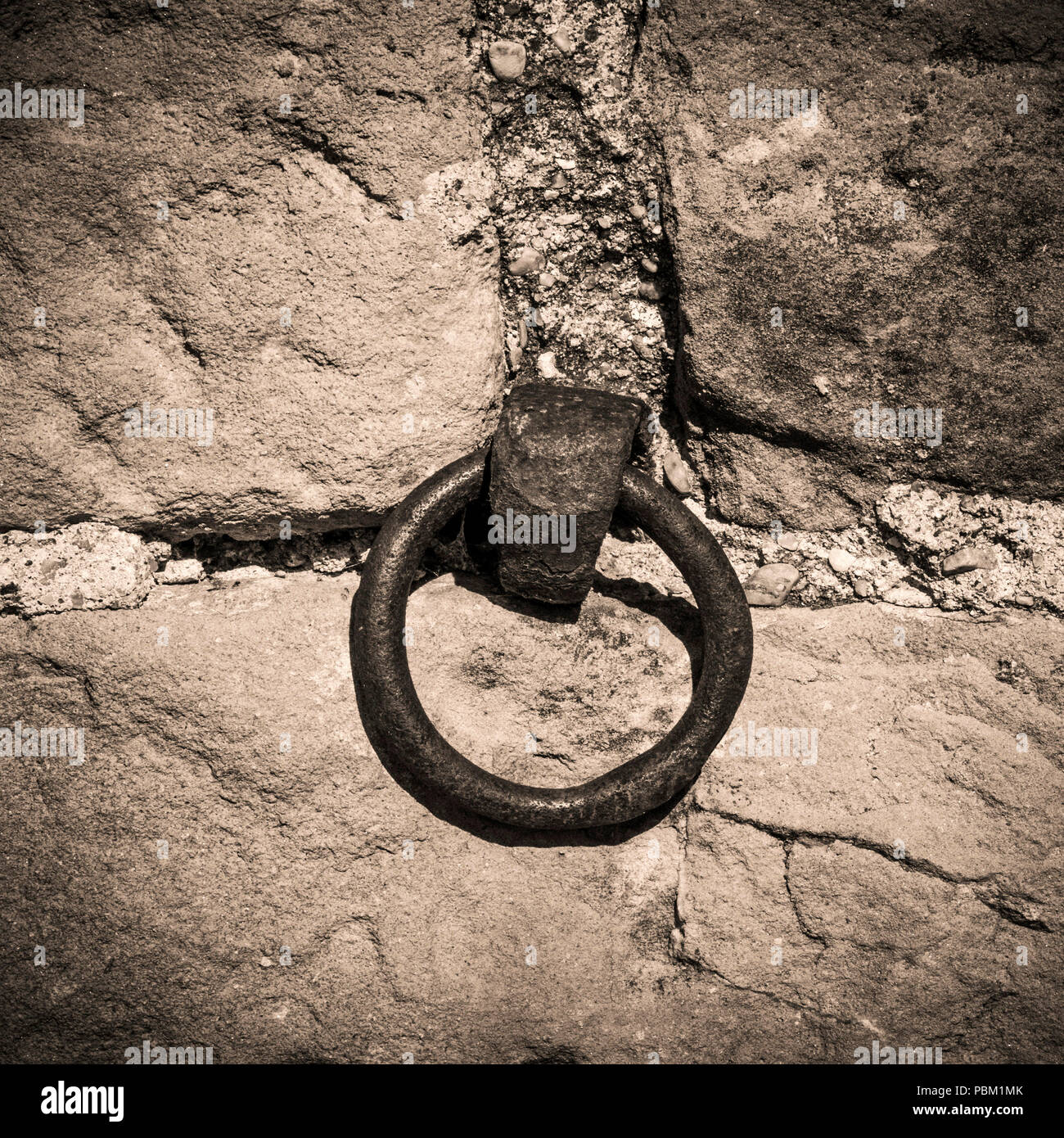 Iron ring in stone wall hi-res stock photography and images - Alamy