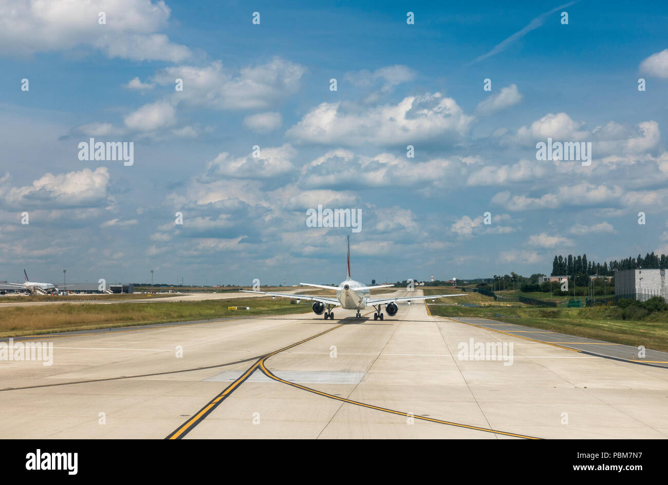 Small airplane ready to take of at runway, airport Charles de Gaulle ...