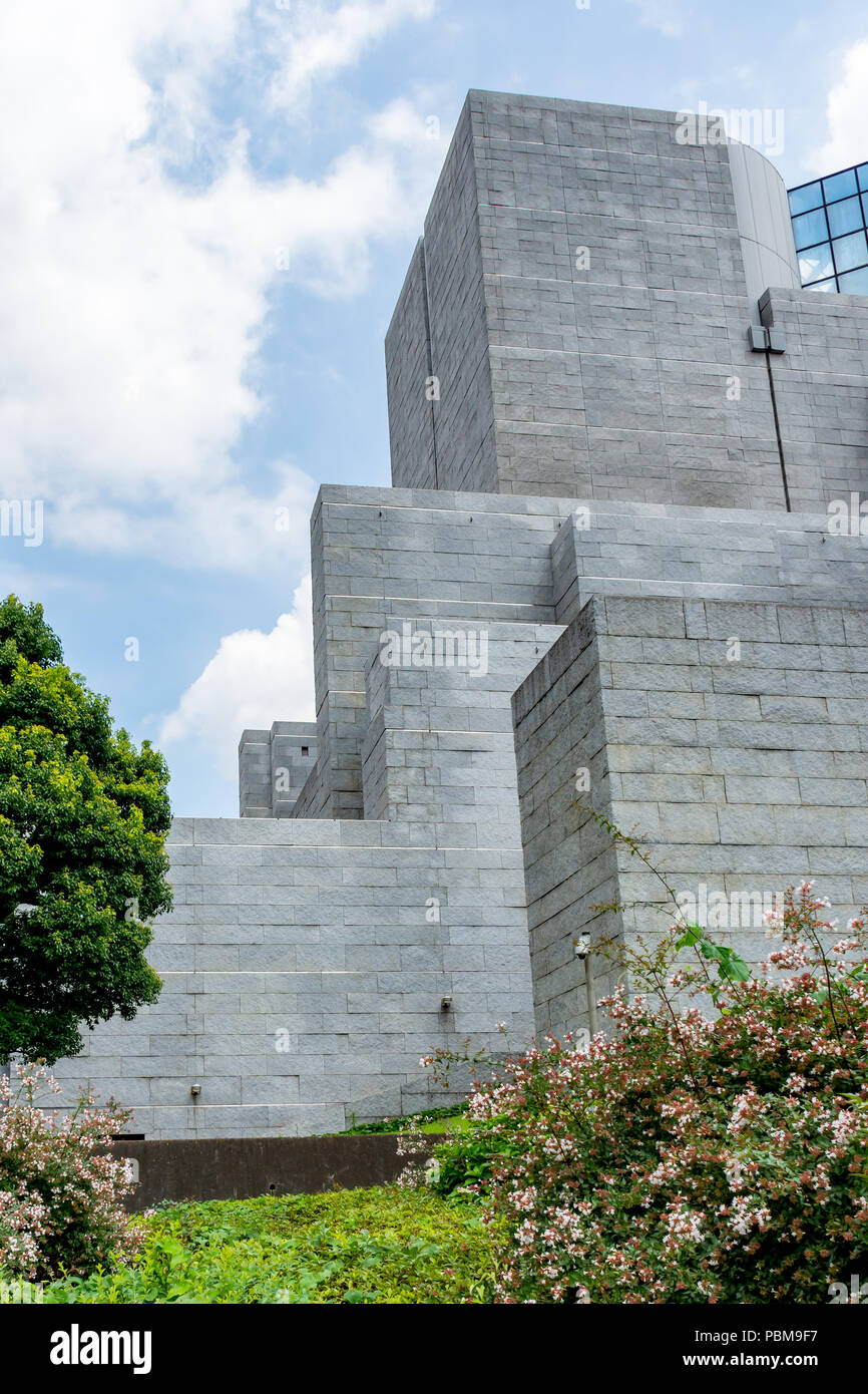 Angular grey stone buildings part of government buildings in Tokyo ...