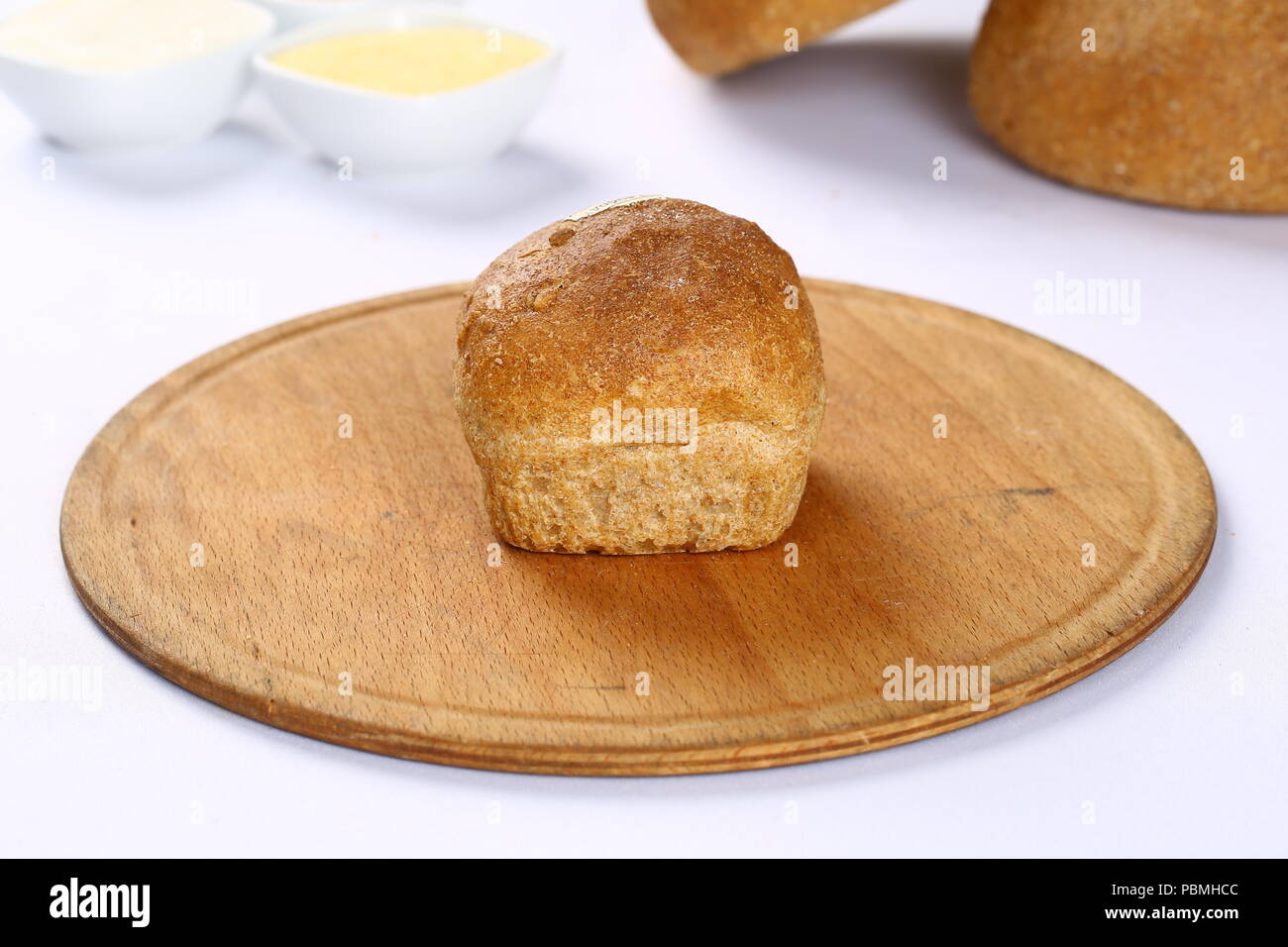 Bread bun with seeds isolated on a white background Stock Photo - Alamy