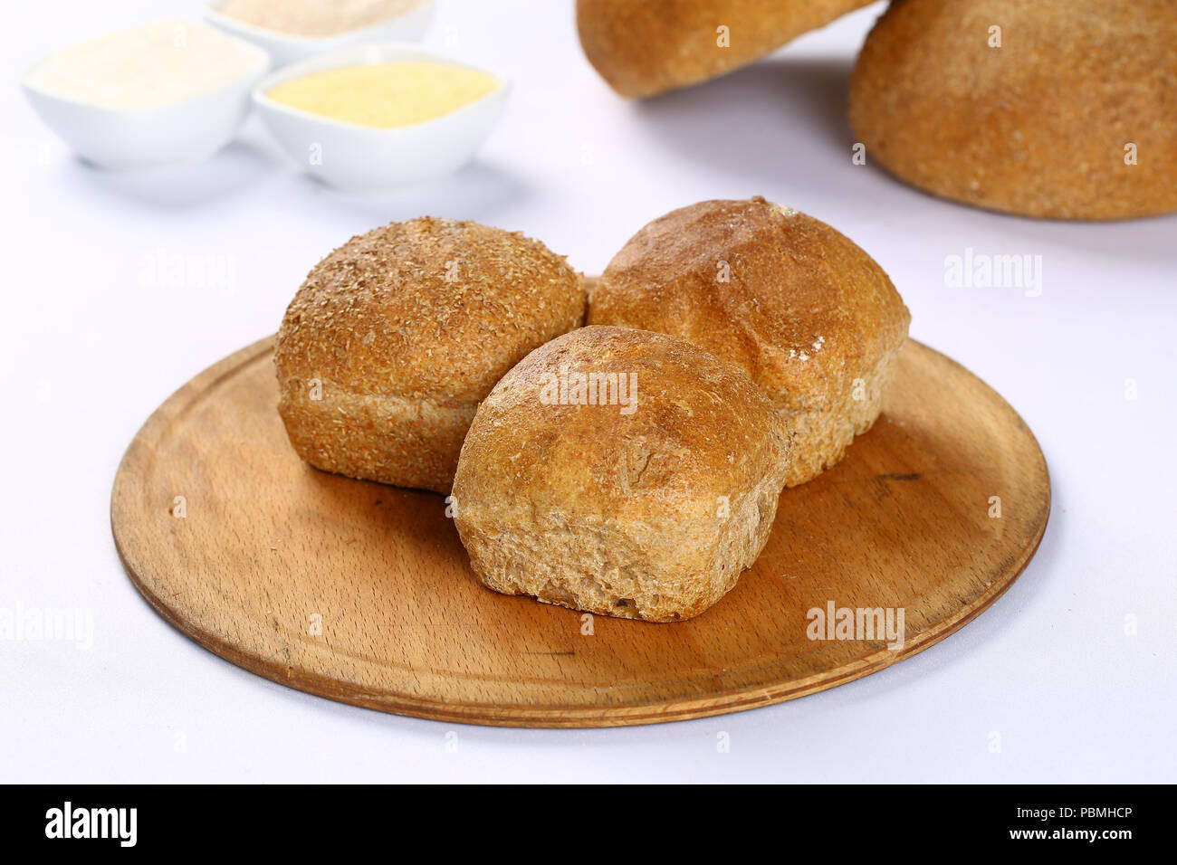 Bread bun with seeds isolated on a white background Stock Photo - Alamy