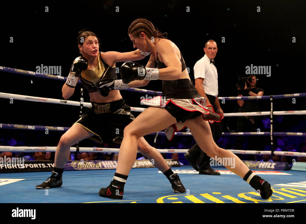Katie Taylor (left) in action against Kimberly Connor during their IBF ...