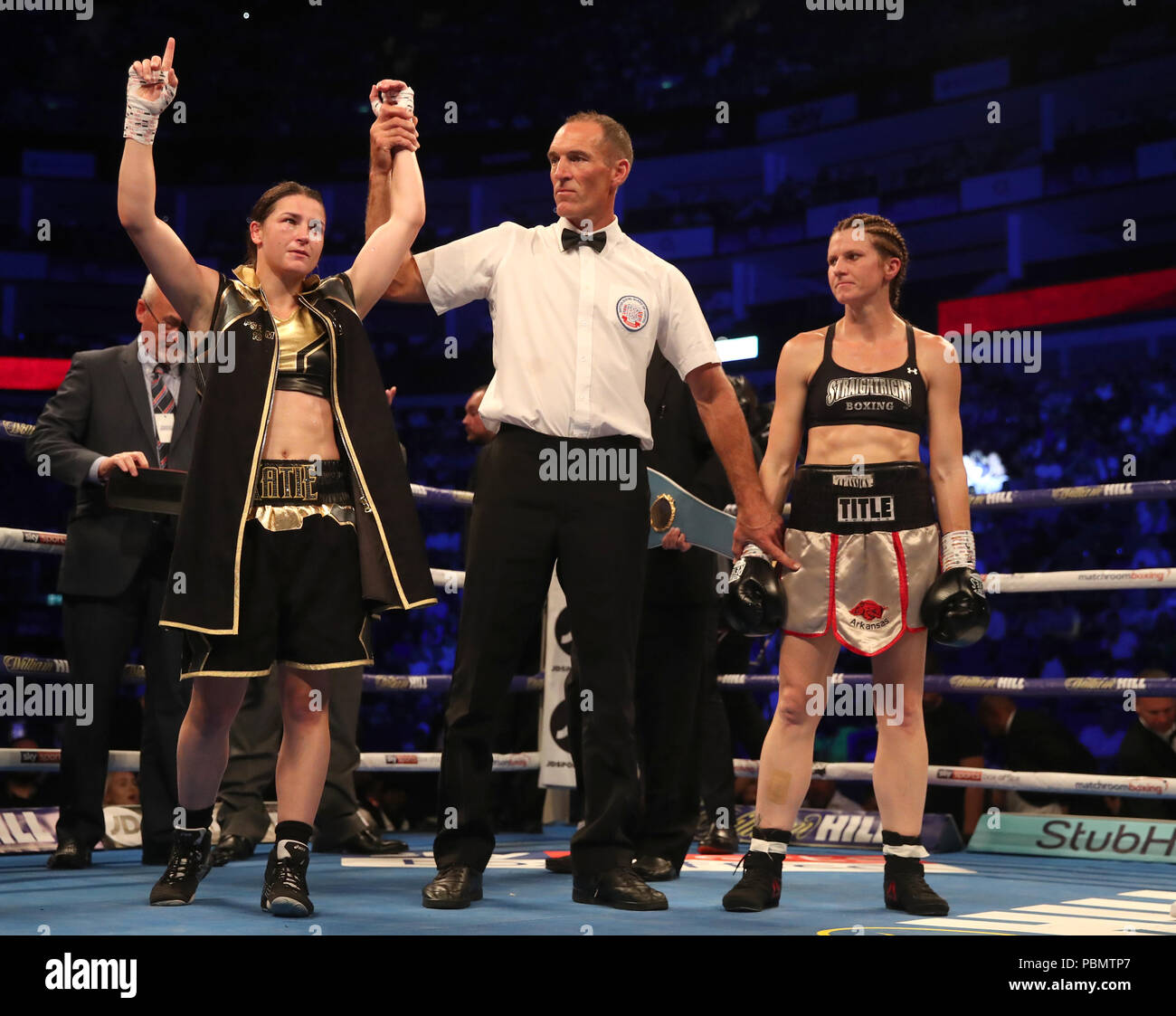Katie Taylor (left) celebrates beating Kimberly Connor during their IBF ...
