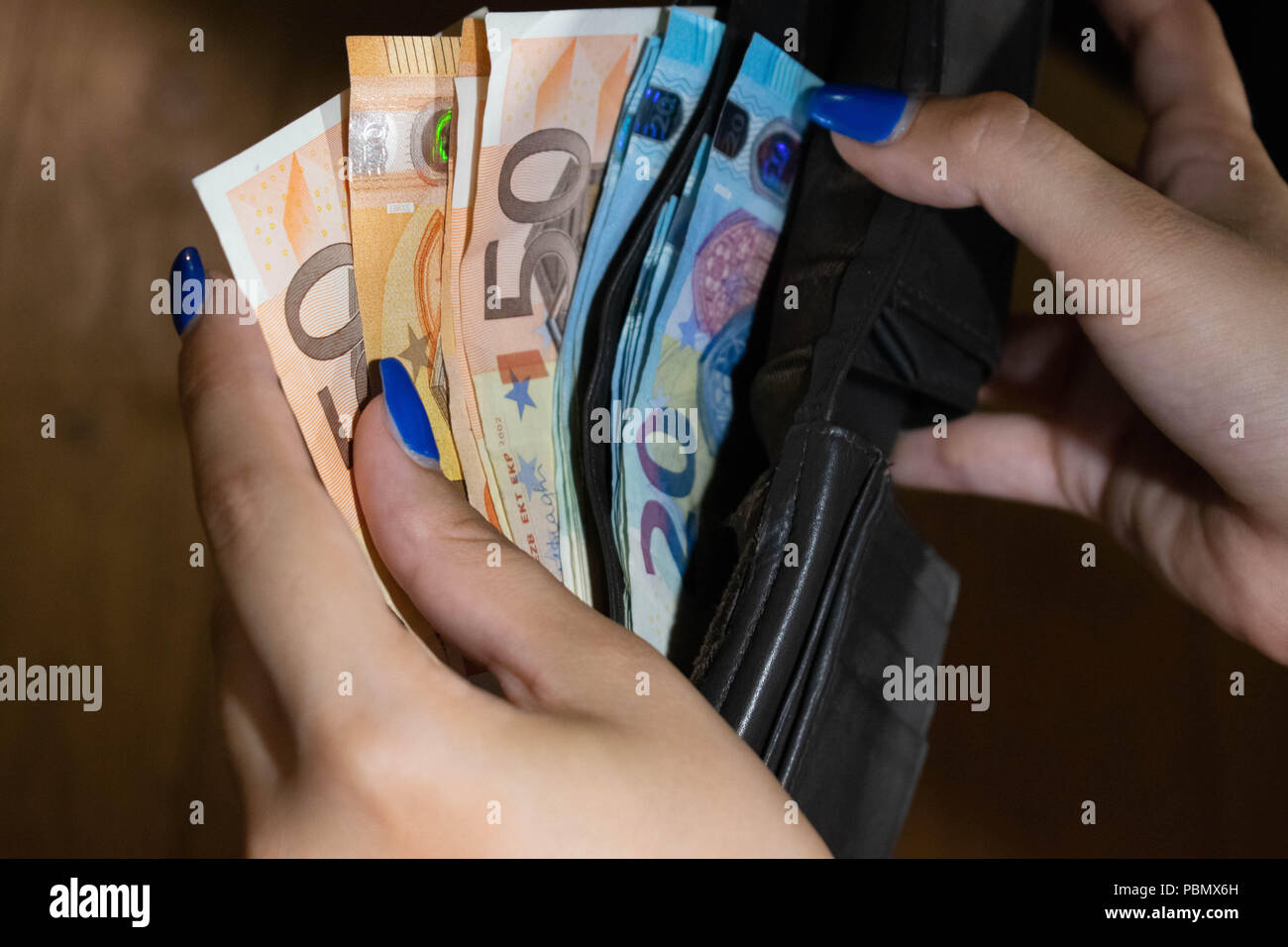 money in my wallet Stock Photo - Alamy