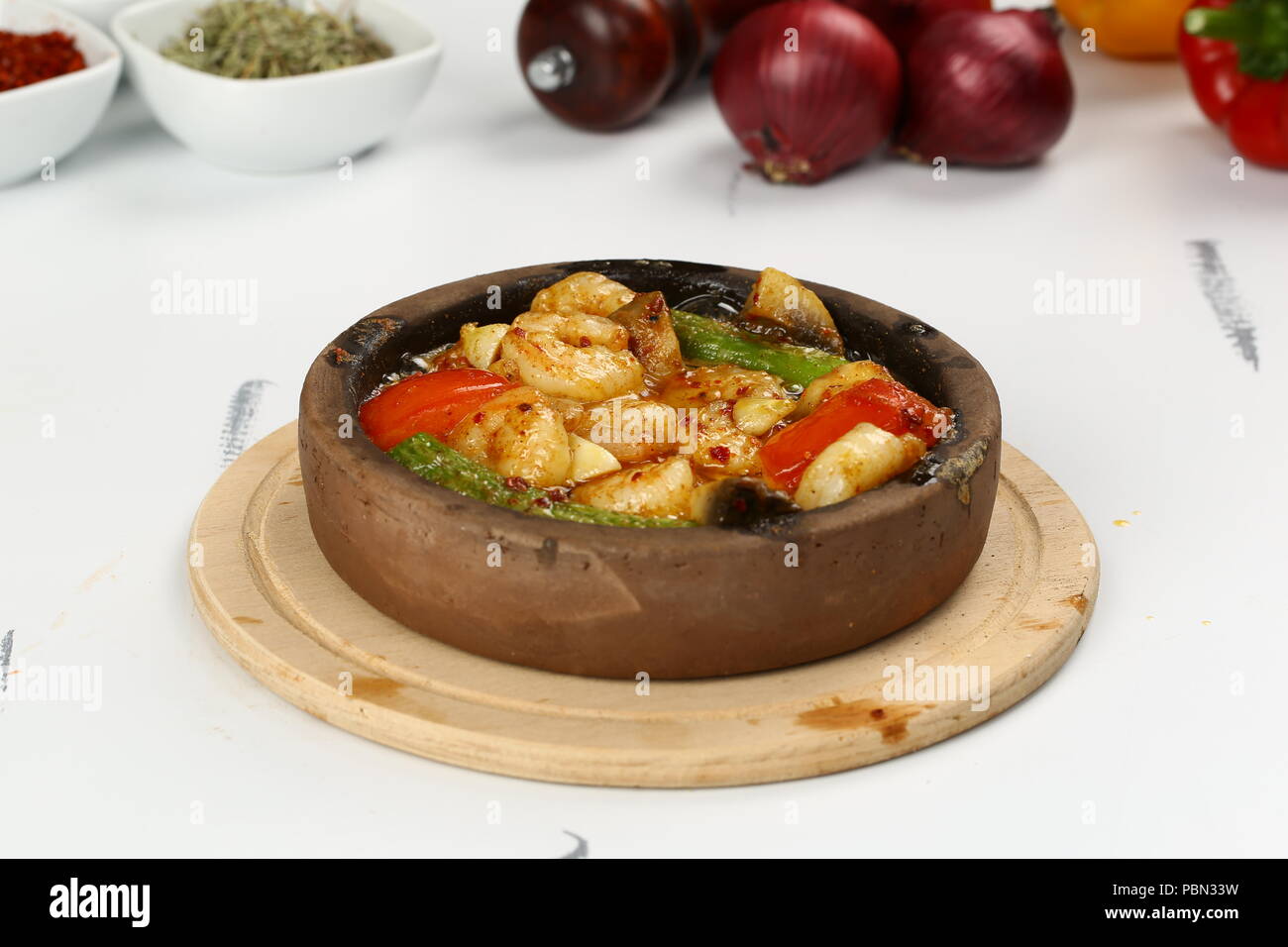 Fish meat stew sauteed in casserole Stock Photo - Alamy