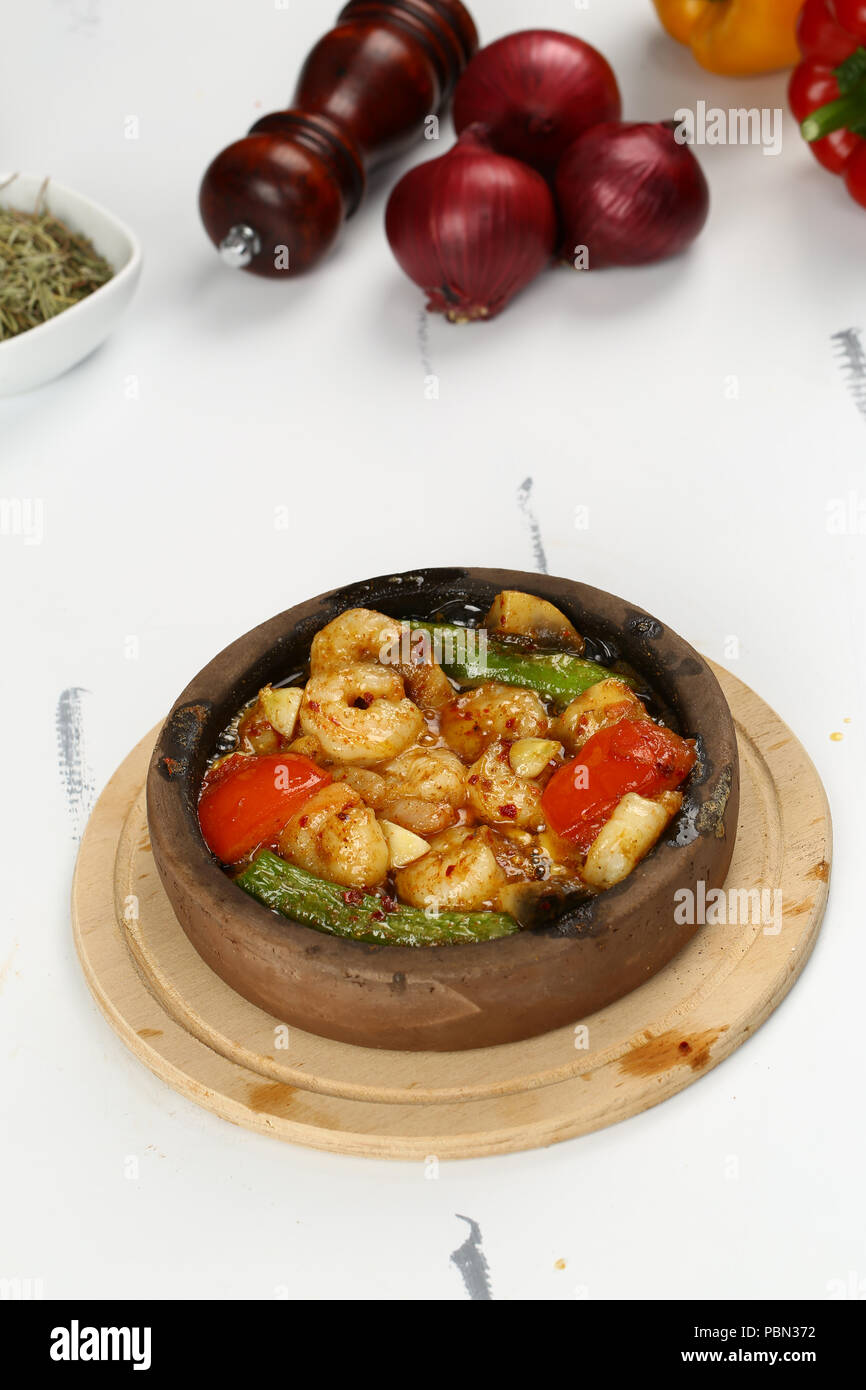 Fish meat stew sauteed in casserole Stock Photo - Alamy