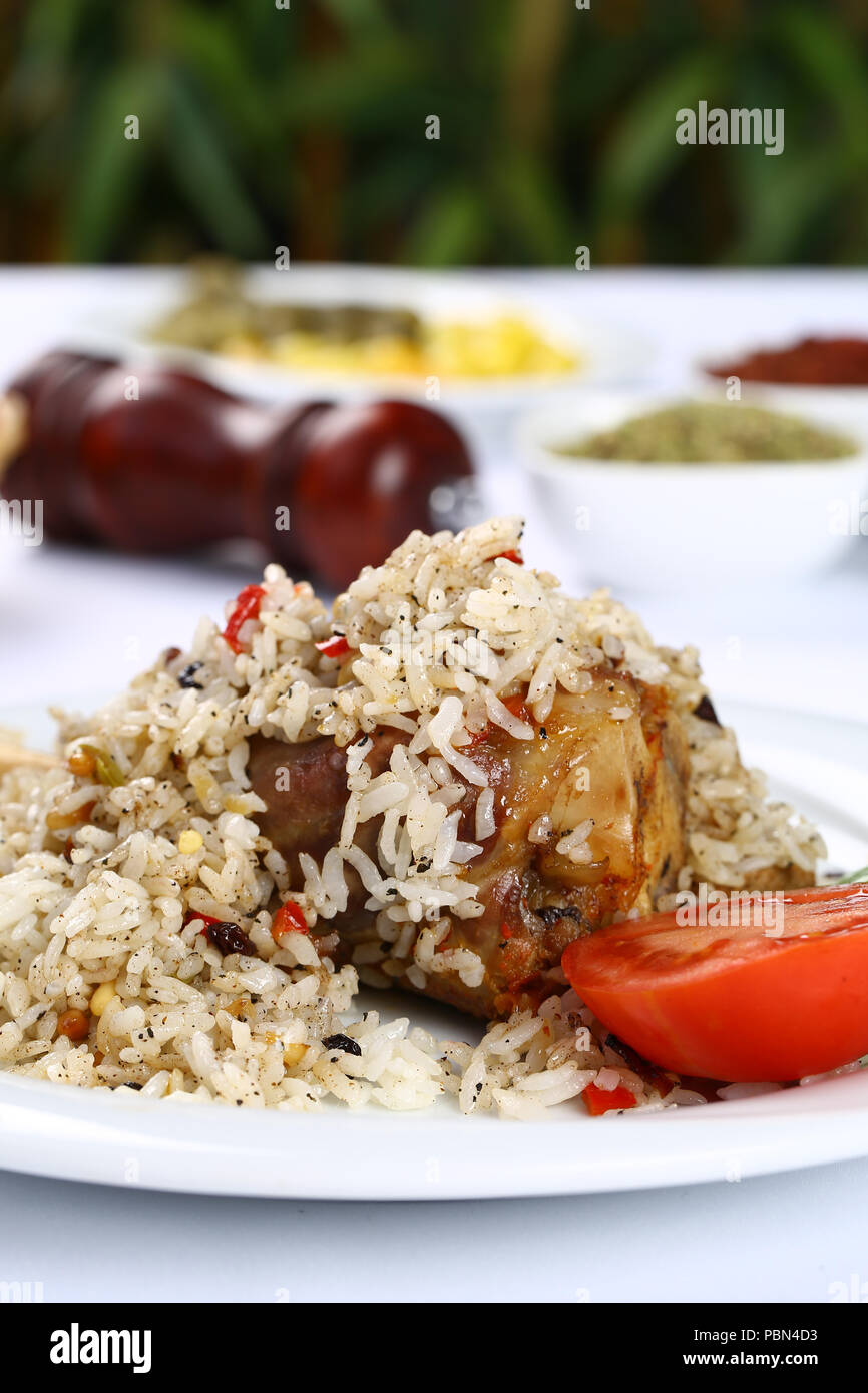 Beef meat with rice on plate Stock Photo - Alamy
