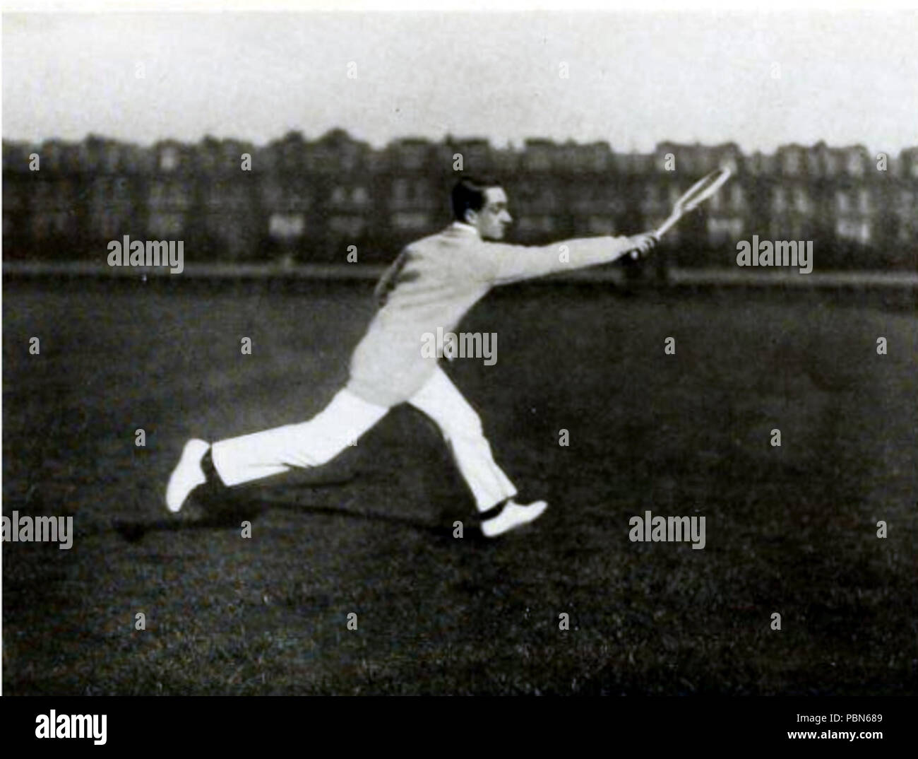 . English: French tennis player Max Decugis, making a forehand. before ...