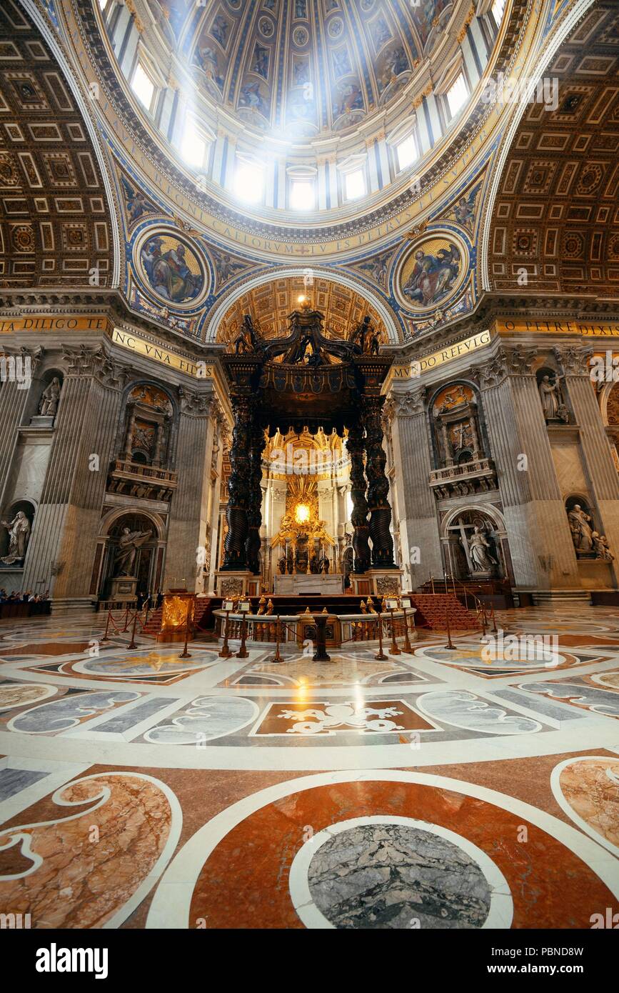 St. Peter’s Basilica interior with light beam in Vatican City Stock ...