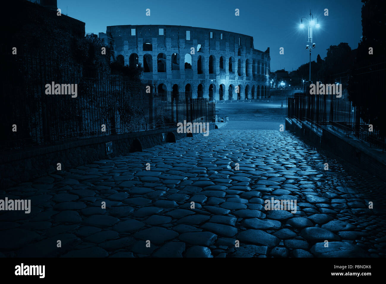 Colosseum at night in Rome Italy Stock Photo - Alamy