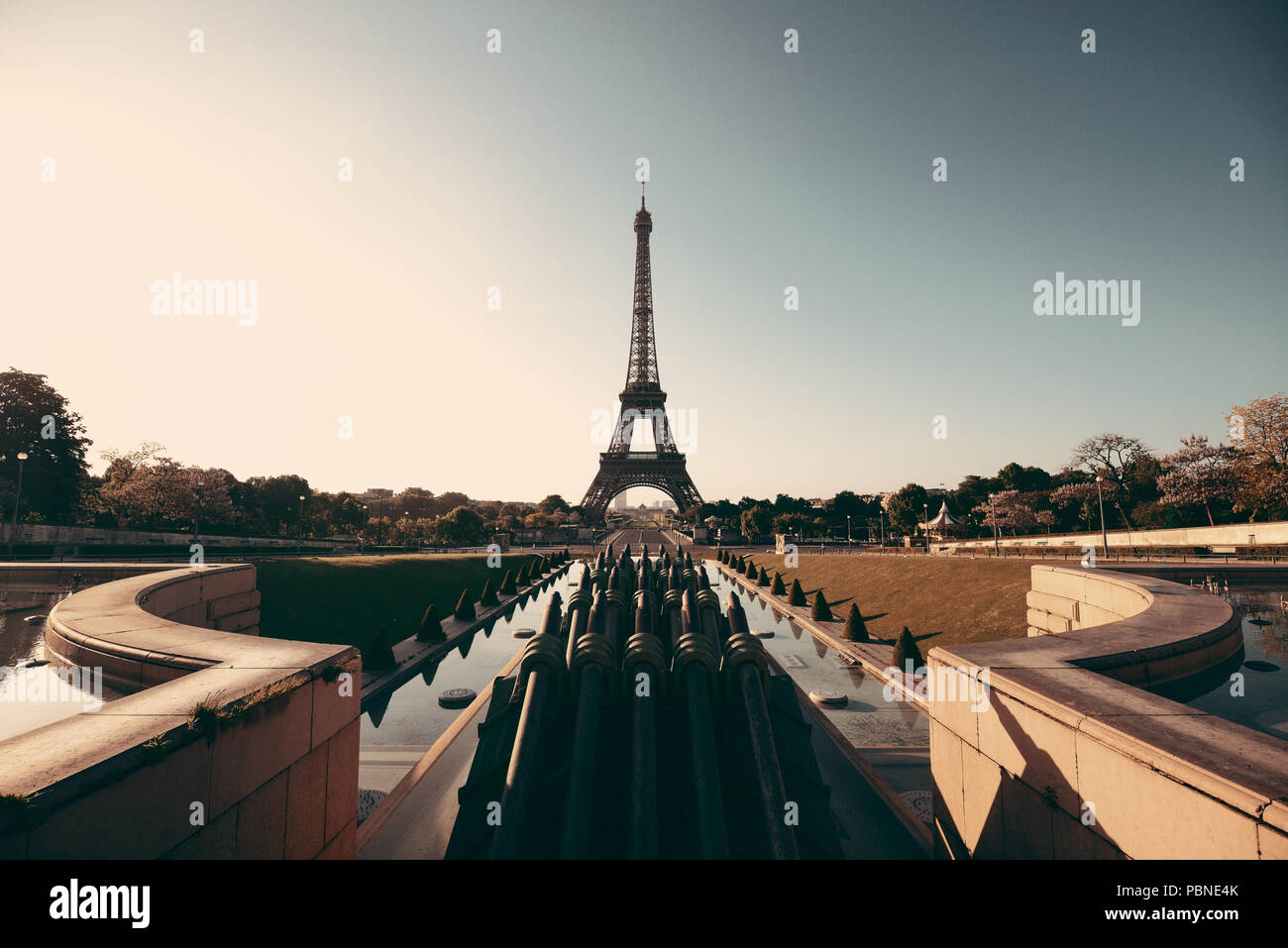 Eiffel Tower with fountain pipe as the famous city landmark in Paris ...