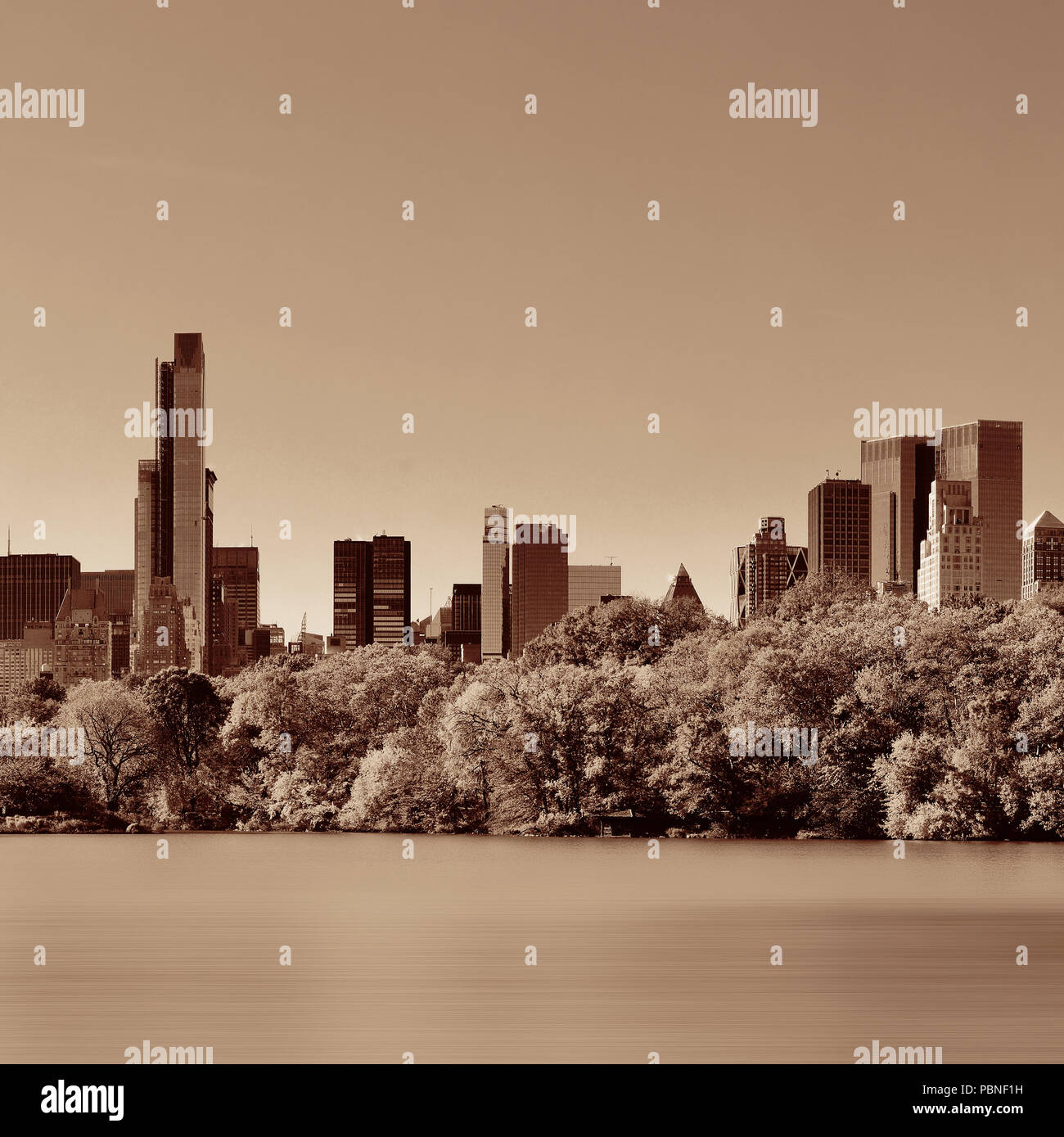 Central Park Autumn and midtown skyline over lake in Manhattan New York City Stock Photo - Alamy