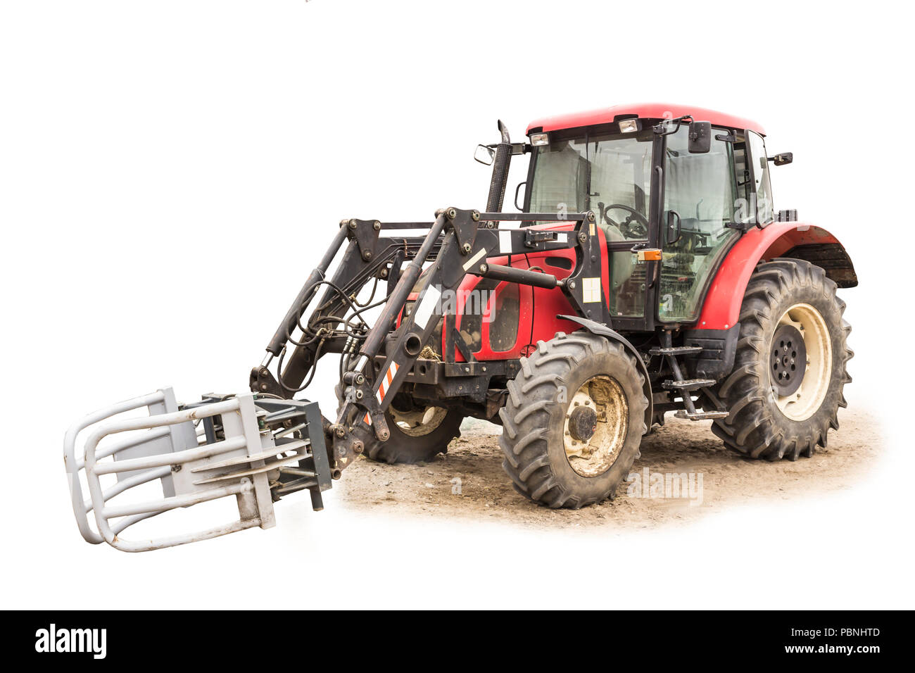 Tractor with hydraulic lift for carrying bales of hay and silage ...