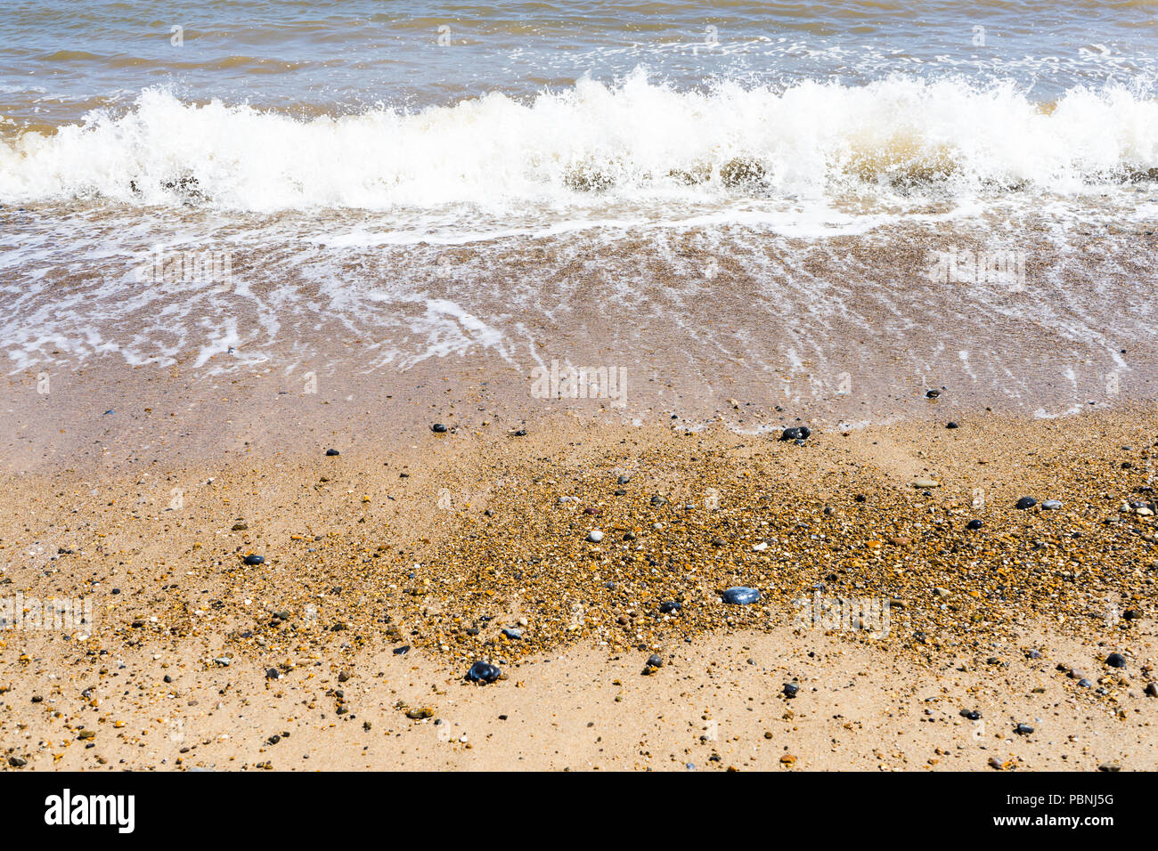 Sea edge lapping onto a beach on the Great Yarmouth, Norfolk Stock ...