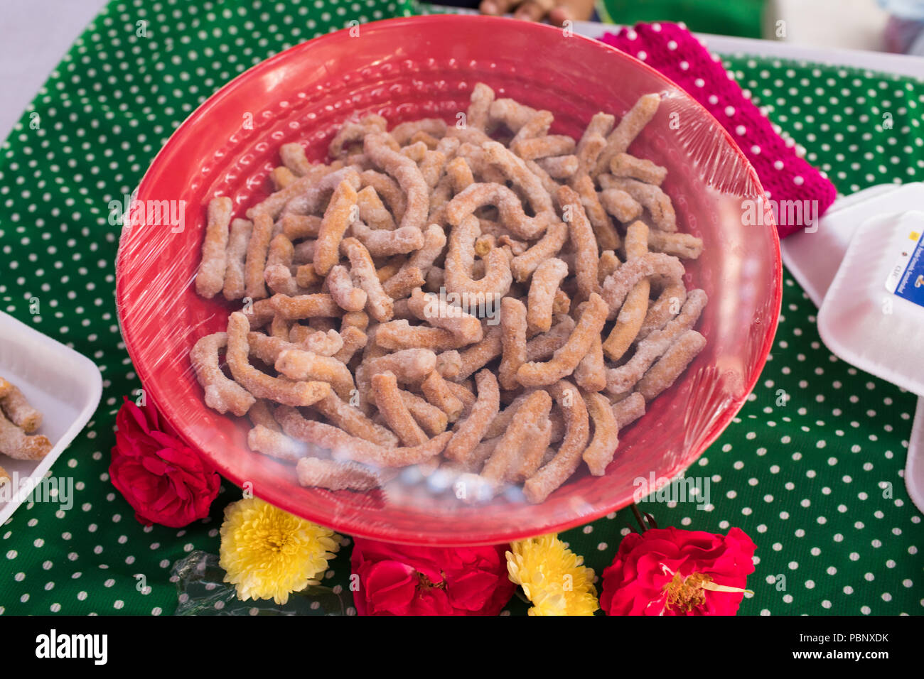 Seerni is a Sugar glazed gram sticks indian sweet Stock Photo - Alamy