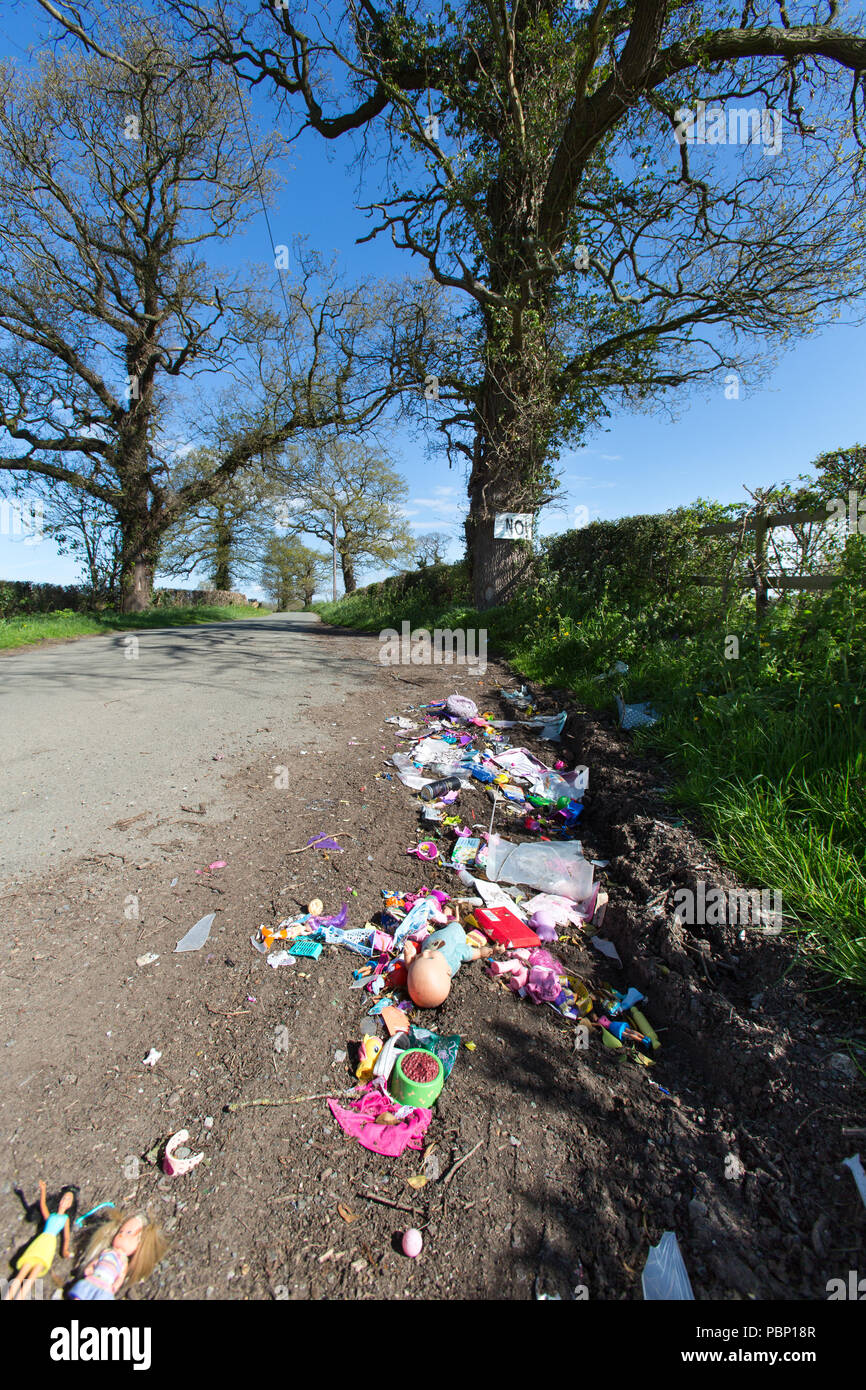 View of fly-tipping in a rural layby at Redwither Lane, near the ...