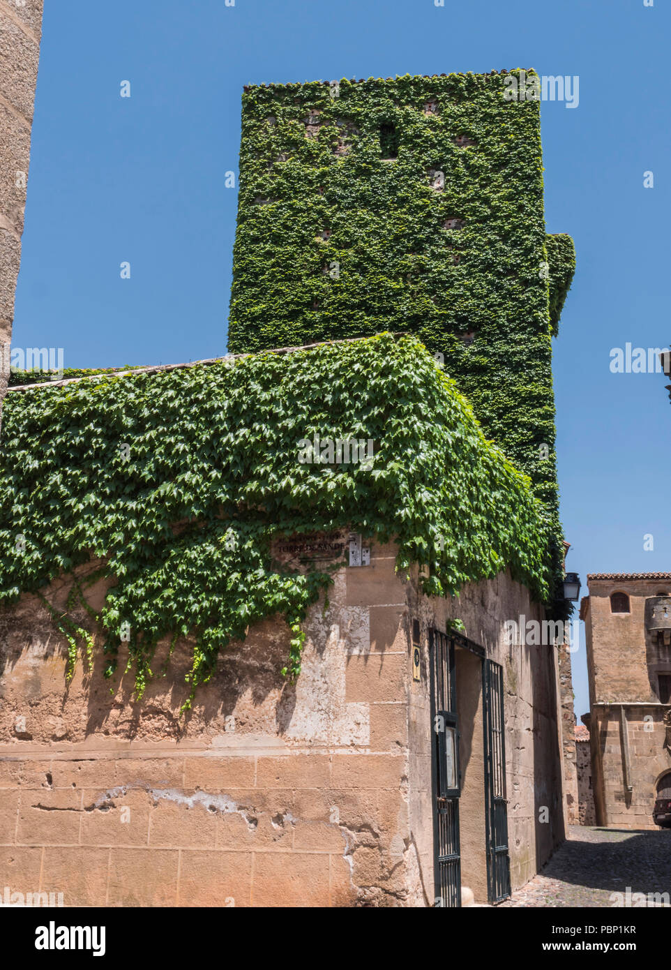 Caceres, Spain - july 13, 2018: House of the walls-Saavedra and tower ...