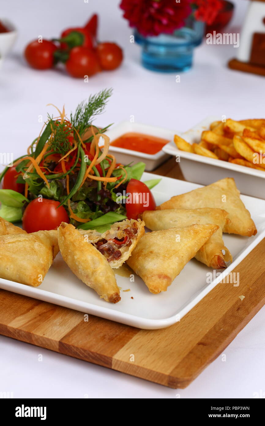 Fried Golden Dough, Stuffed Turkish pisi Stock Photo - Alamy