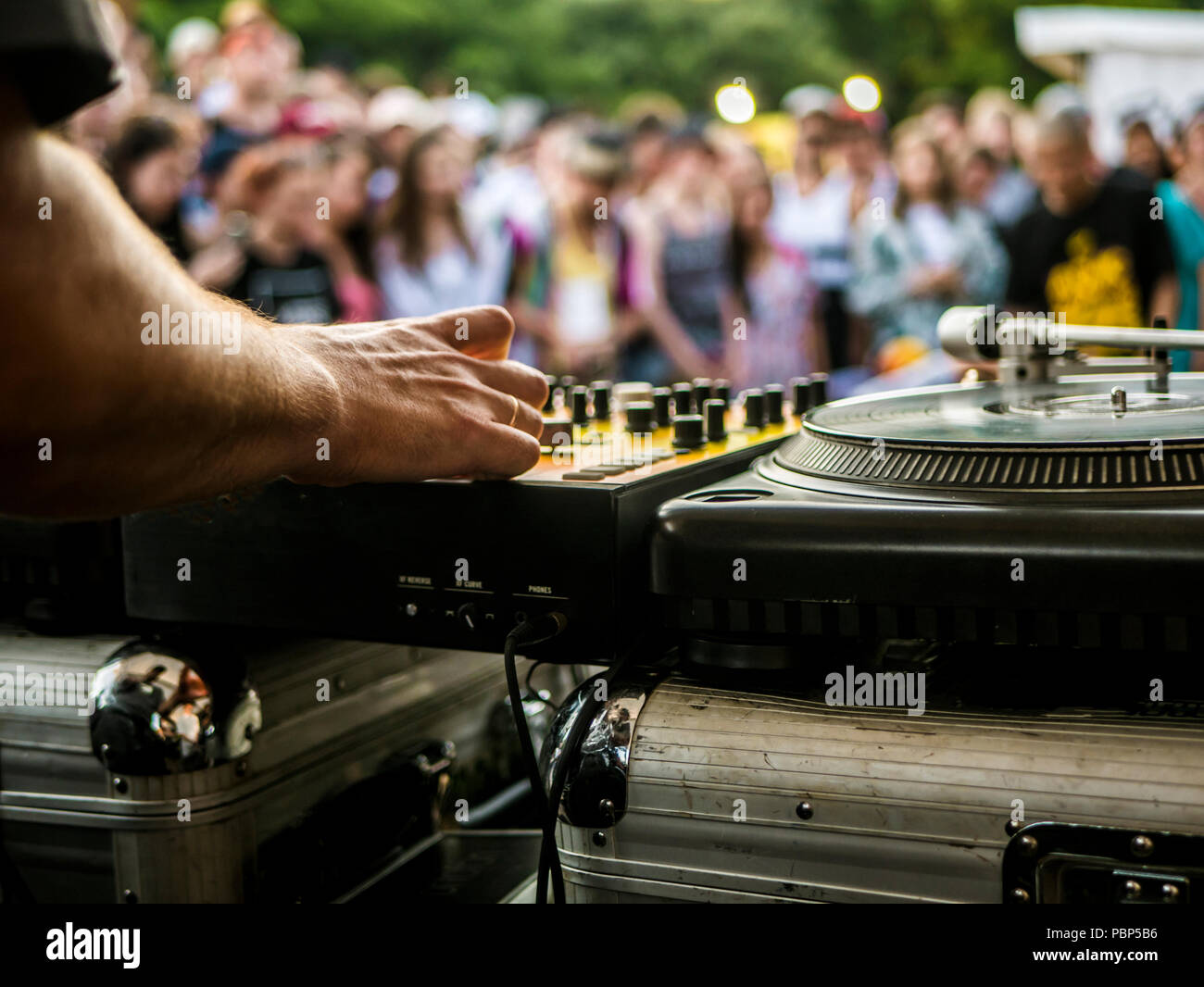 dj party adjusting Stock Photo - Alamy
