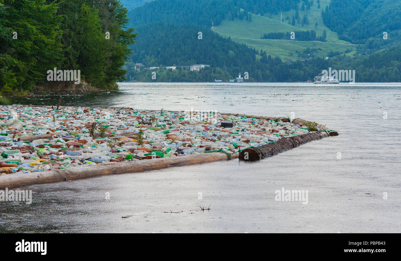 lake pollution with plastic bags in the water Stock Photo - Alamy
