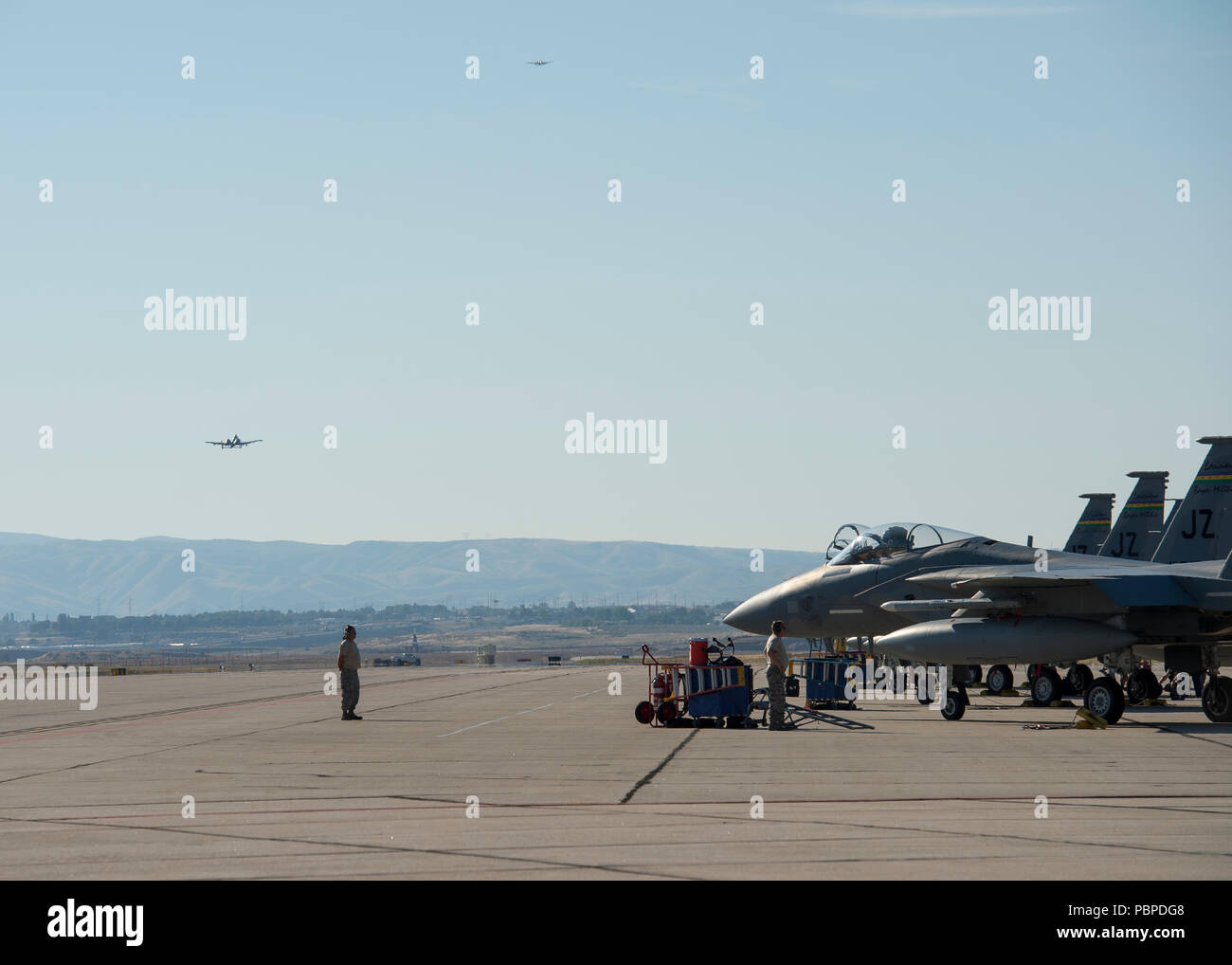 Two A-10 Thunderbolt IIs from the 190th Fighter Squadron take off from ...