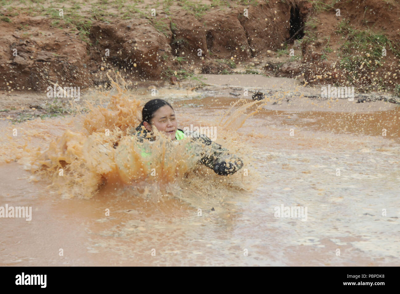 Spc. Diane Hoang, from the U.S. Army Training Center, competes in the ...