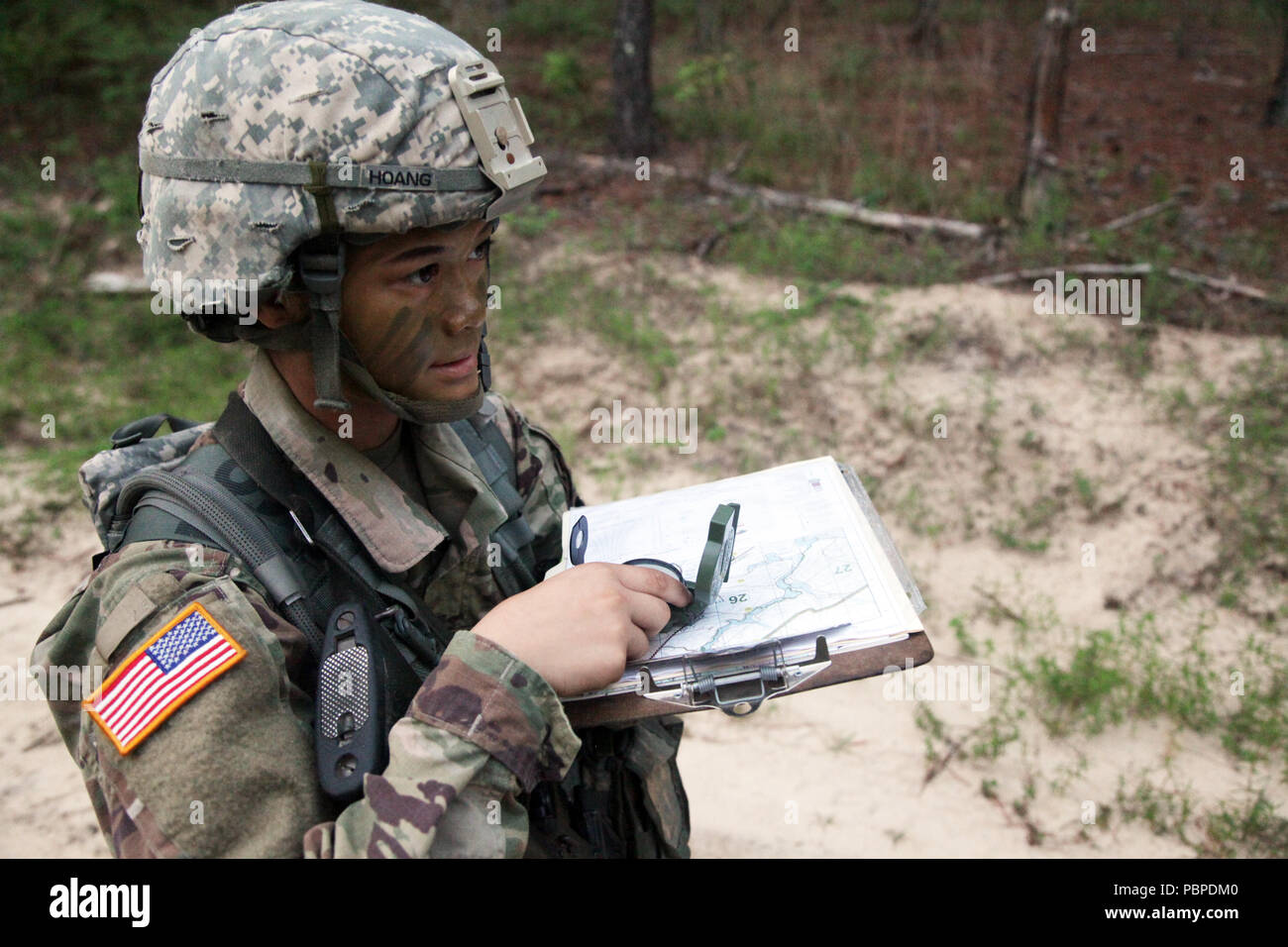 Spc. Diane Hoang, from the U.S. Army Training Center, competes in the ...