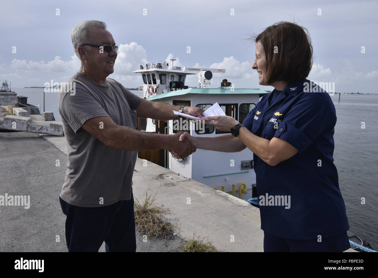 Capt. Megan Dean, commander of Coast Guard Sector Miami, issues a ...