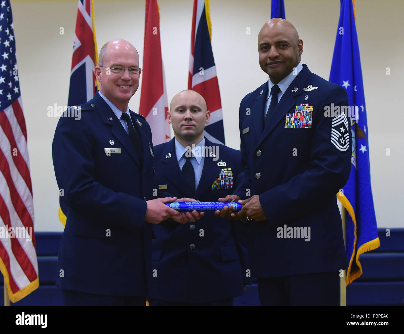 Chief Master Sgt. Rod Lindsey, right, 460th Space Wing outgoing command ...